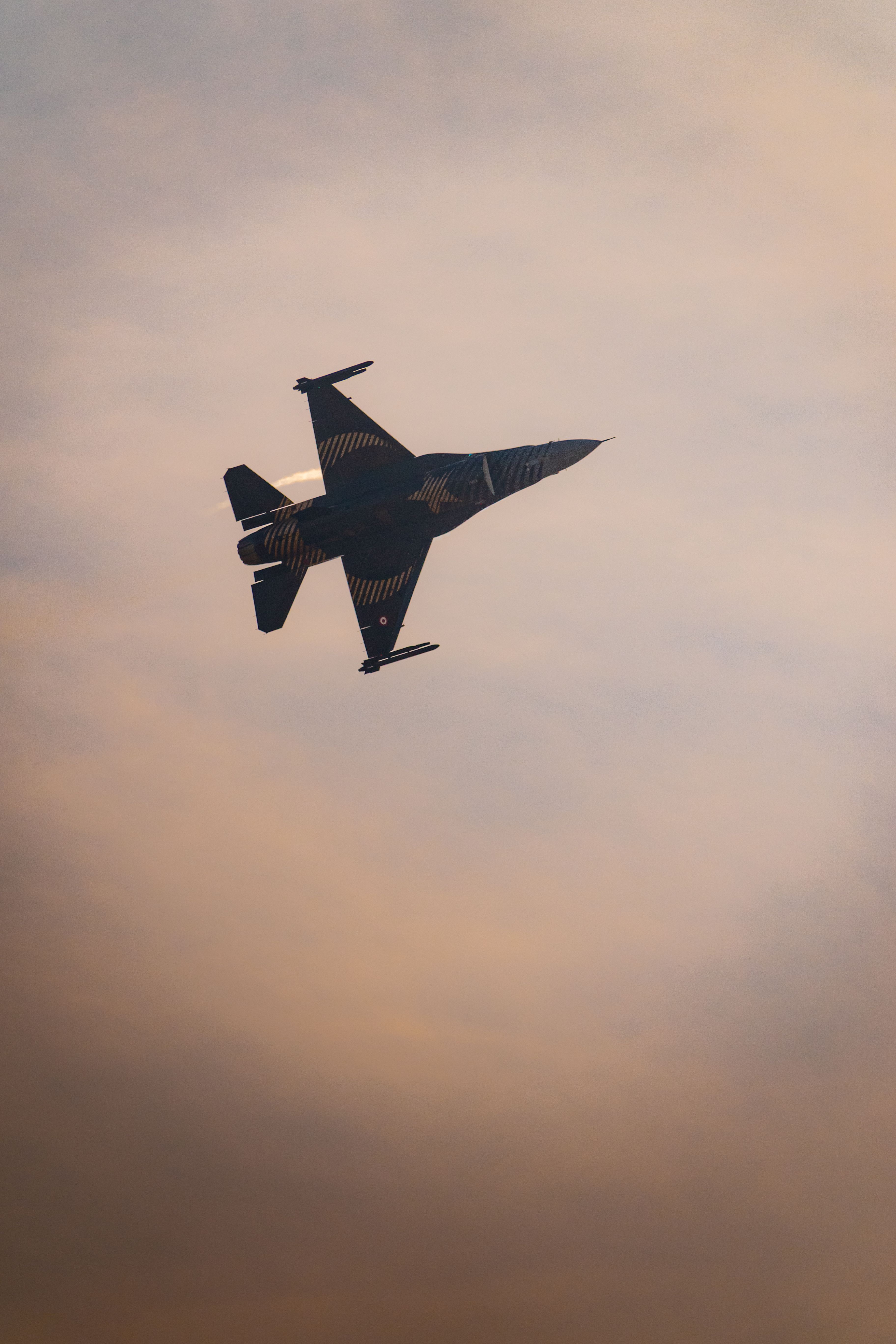 Military Jet in Flight against Dramatic Sky · Free Stock Photo