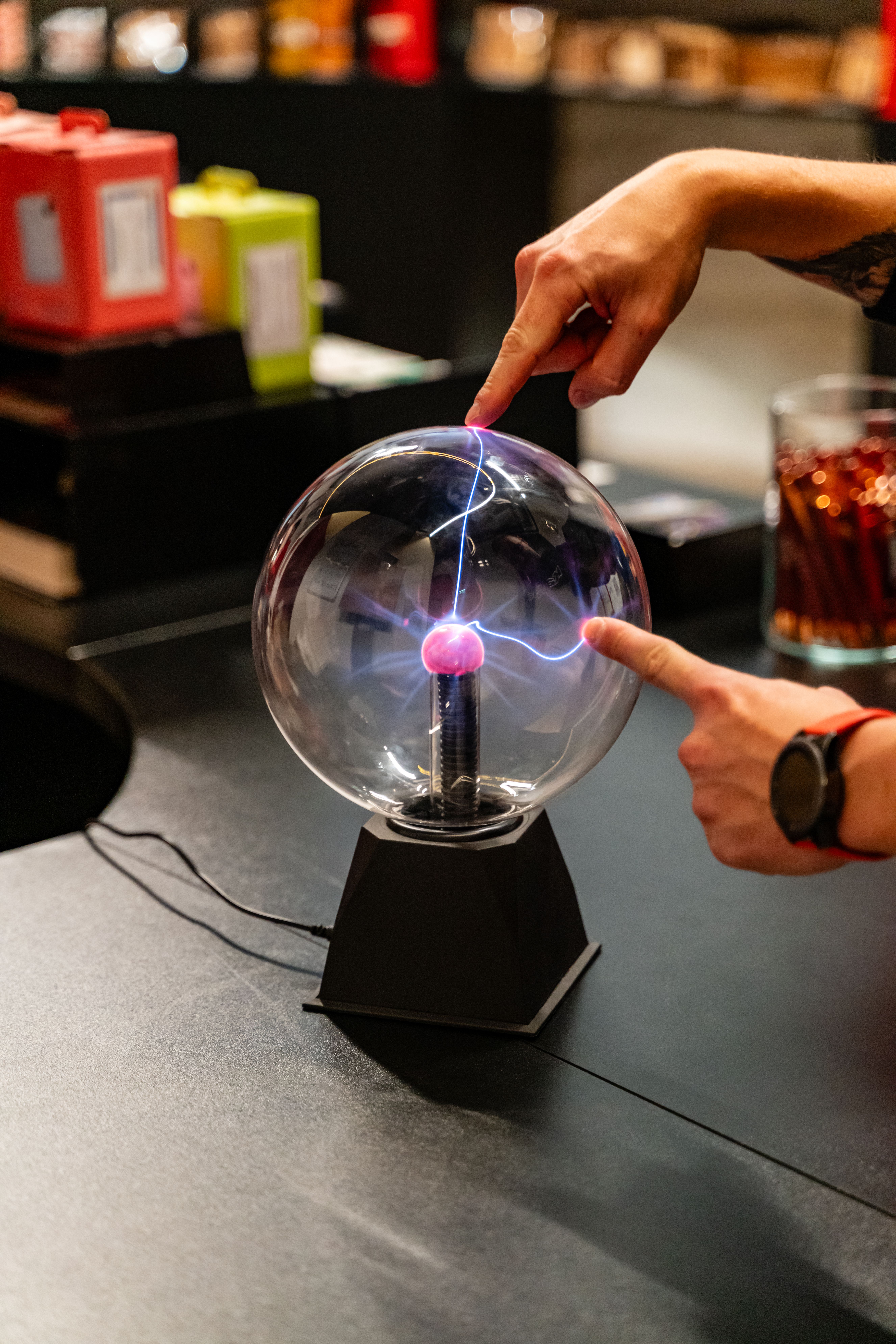 Interactive Plasma Globe in Modern Setting · Free Stock Photo