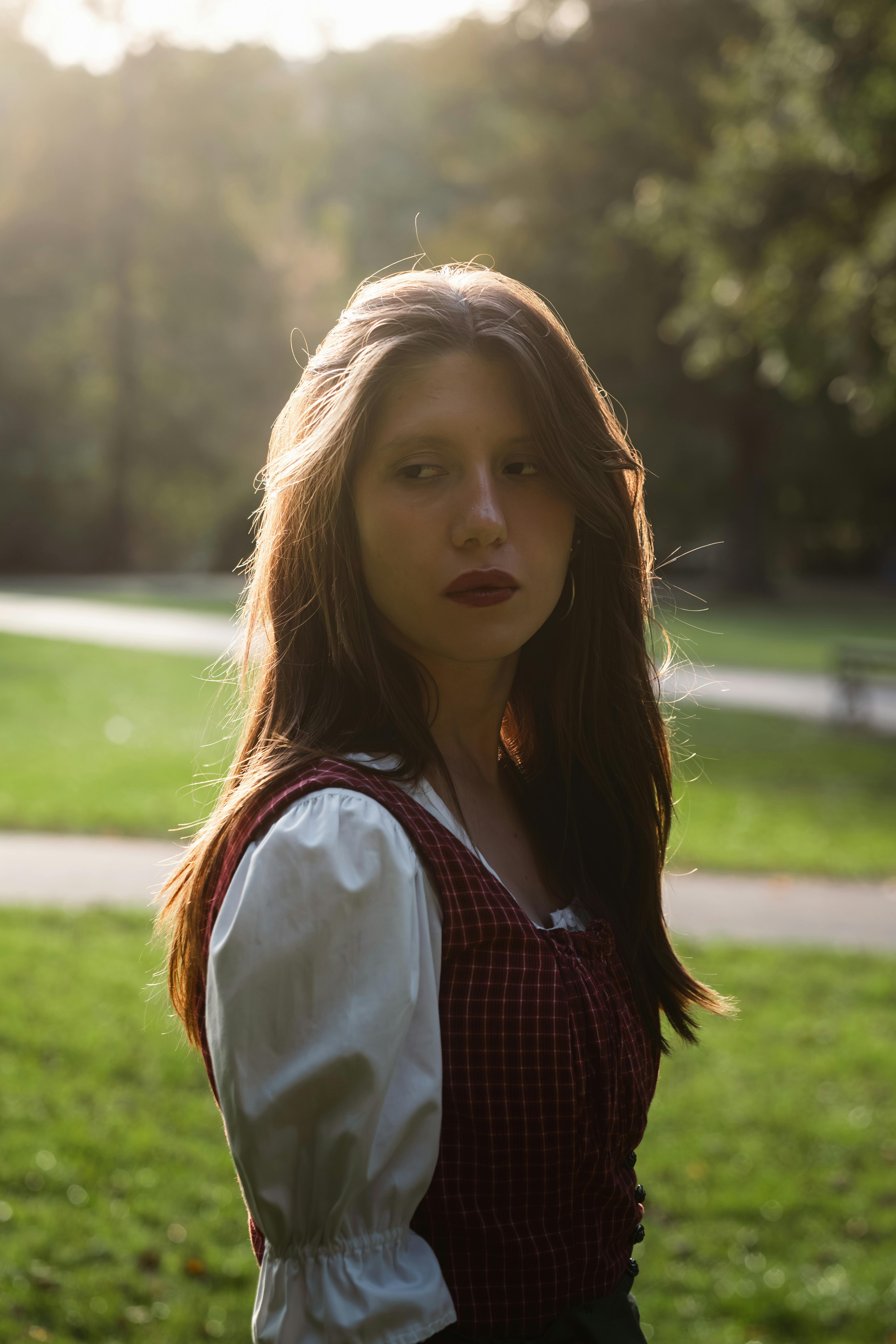 Young Woman in Dirndl with Sunlit Background · Free Stock Photo