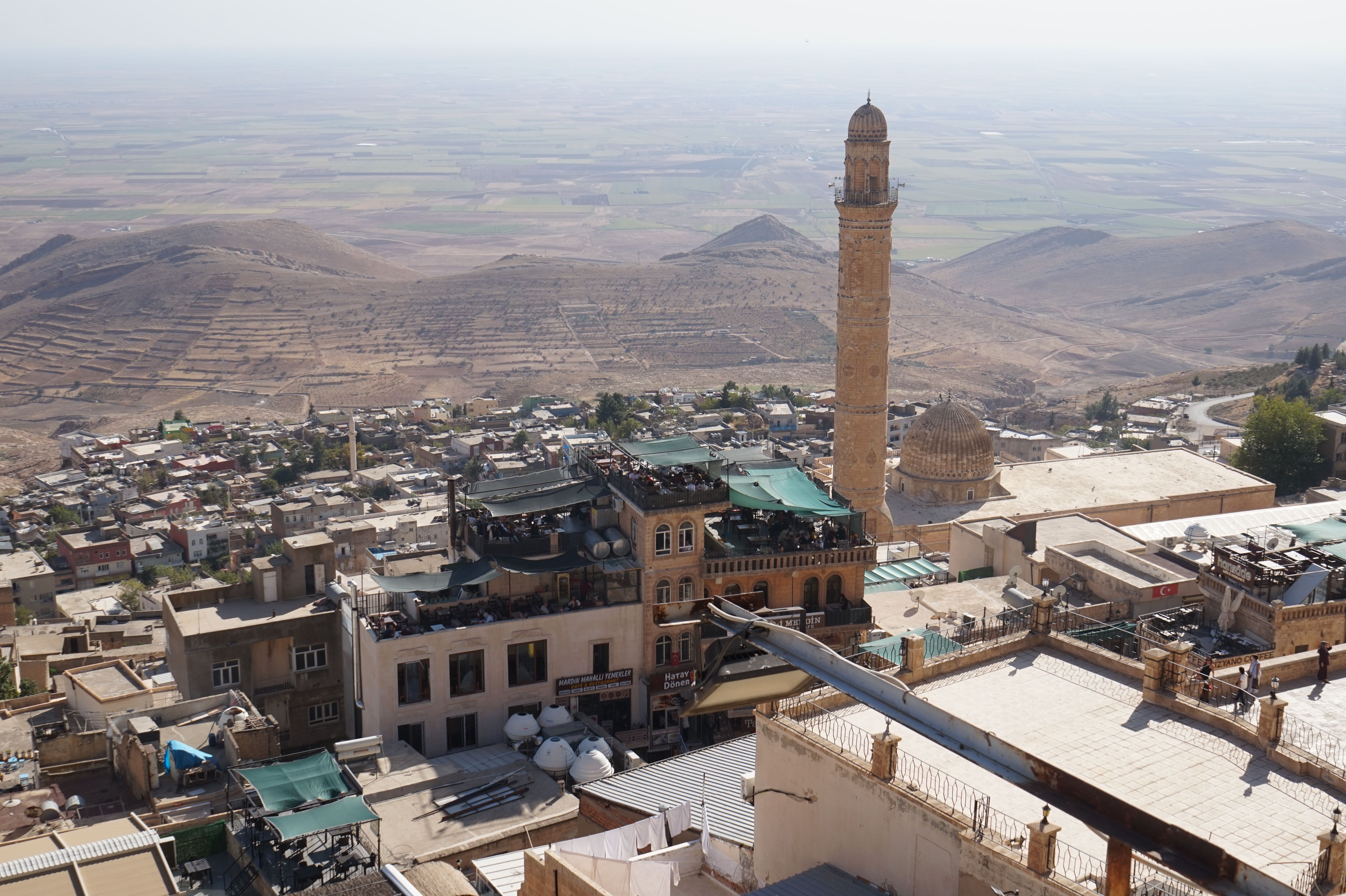 Aerial View of Mardin's Historic Minaret and Landscape · Free Stock Photo