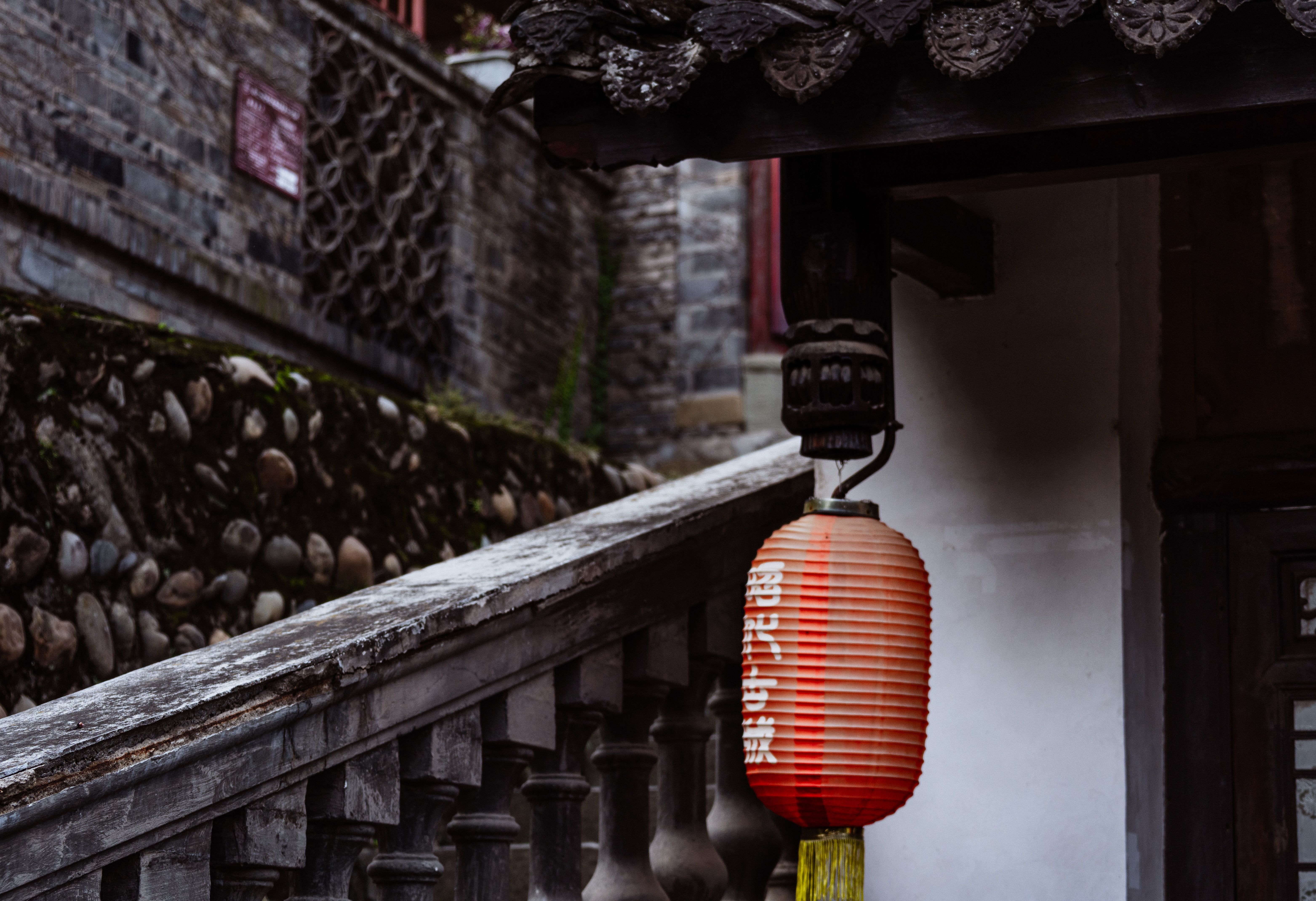 Traditional Red Lantern in Asian Architectural Setting · Free Stock Photo