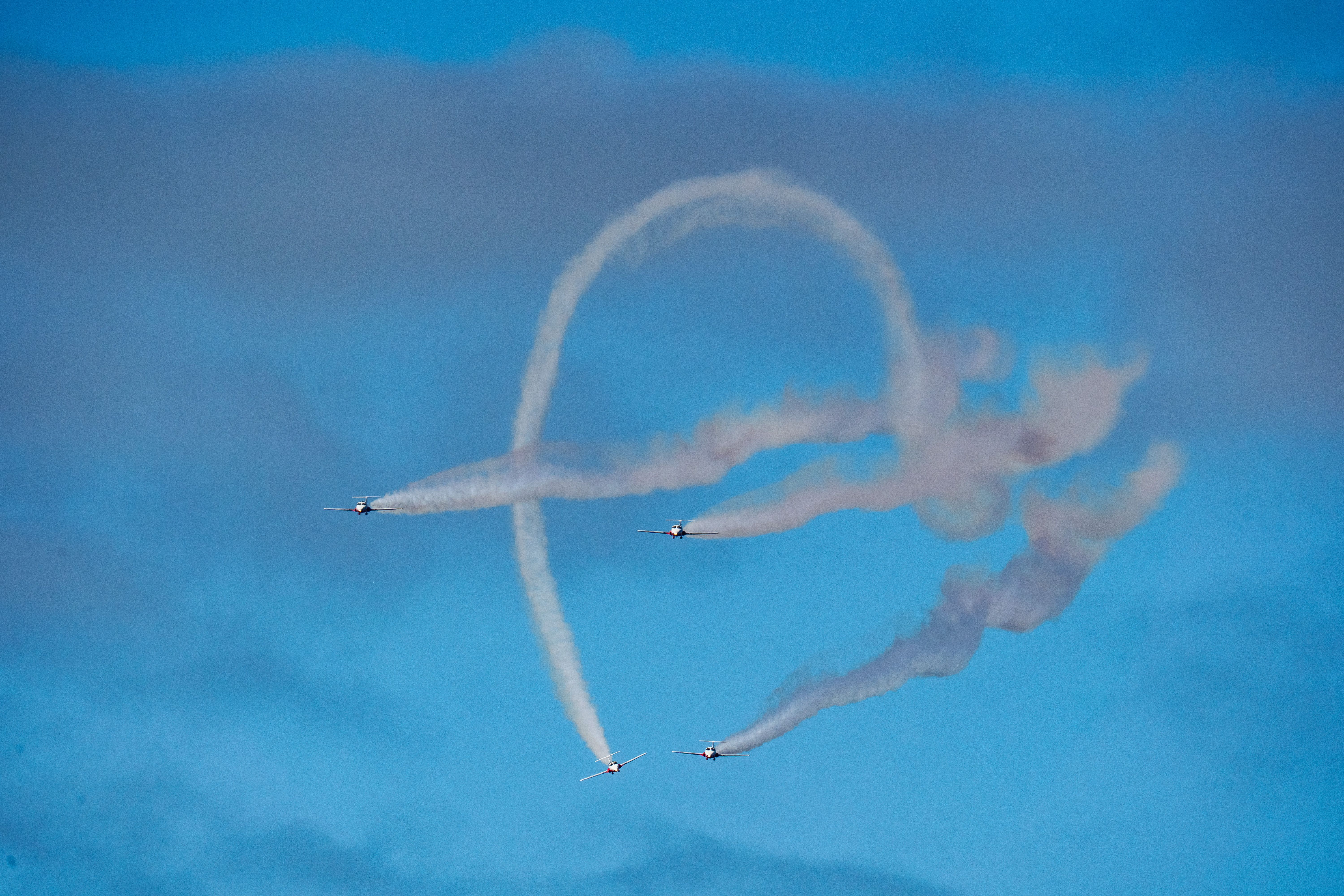 Aerobatic Air Show with Smoke Trails in Blue Sky · Free Stock Photo