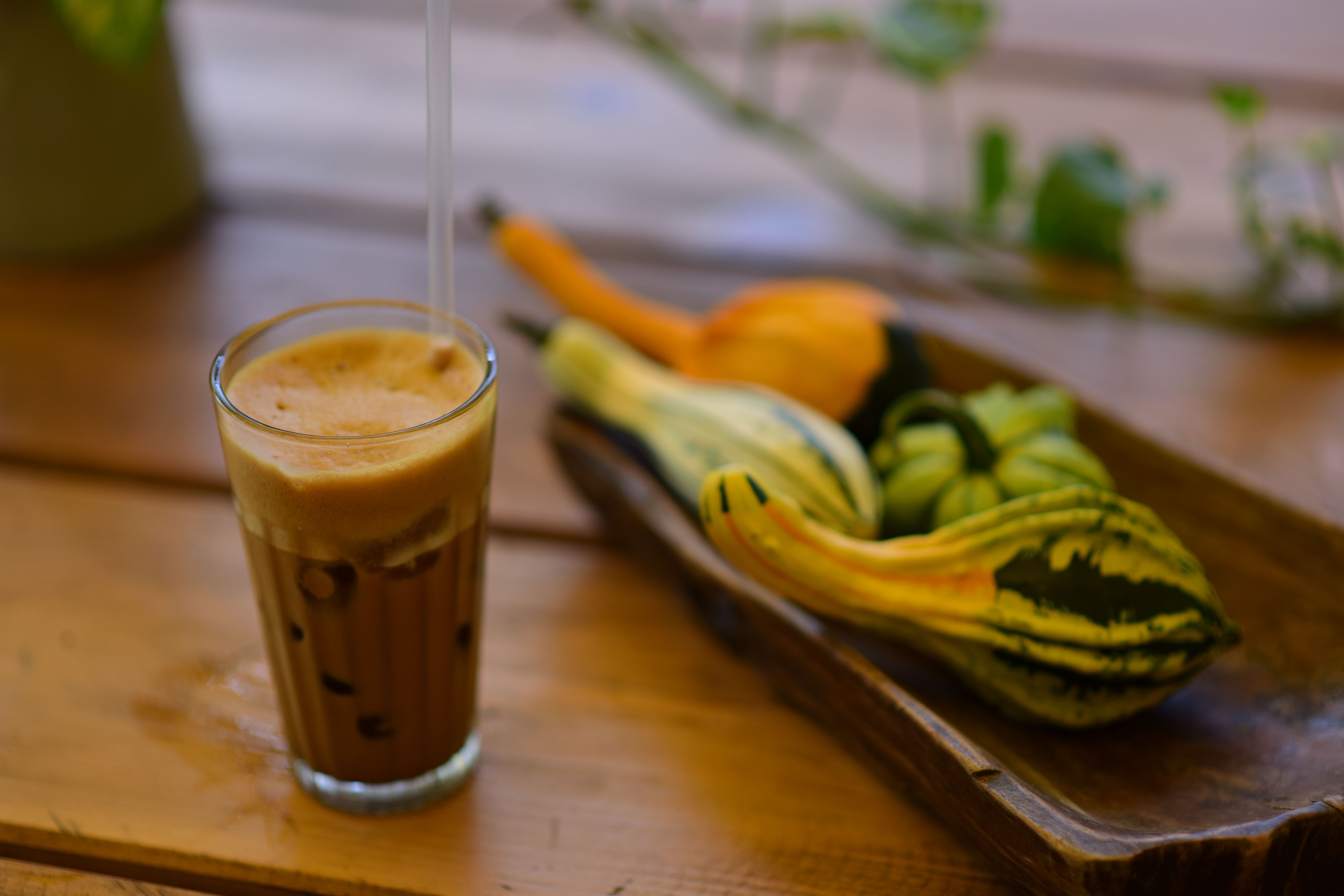 Delicious Iced Coffee with Rustic Autumn Gourds · Free Stock Photo