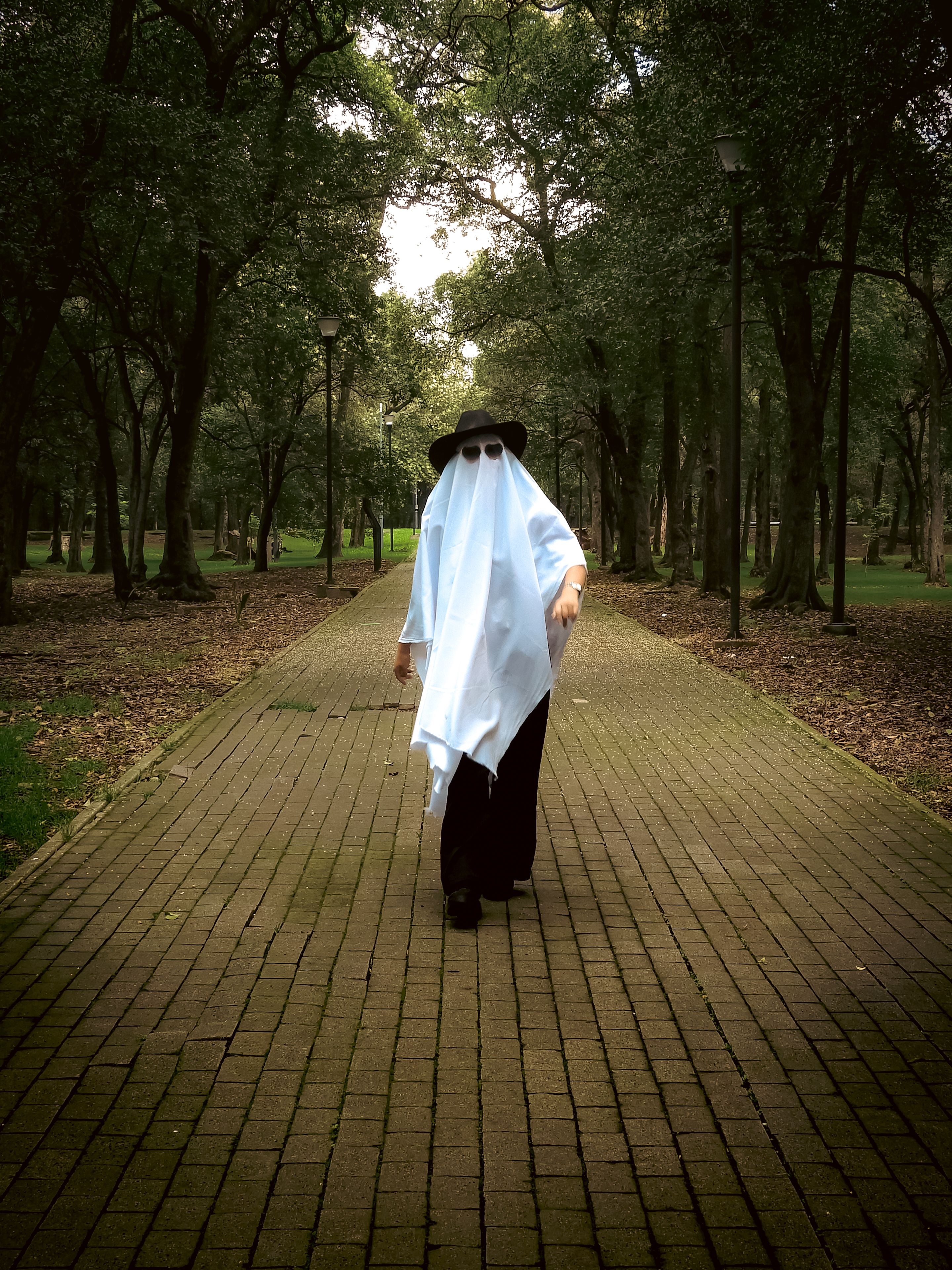 Spooky Park Walk with Ghost Costume in Mexico City · Free Stock Photo