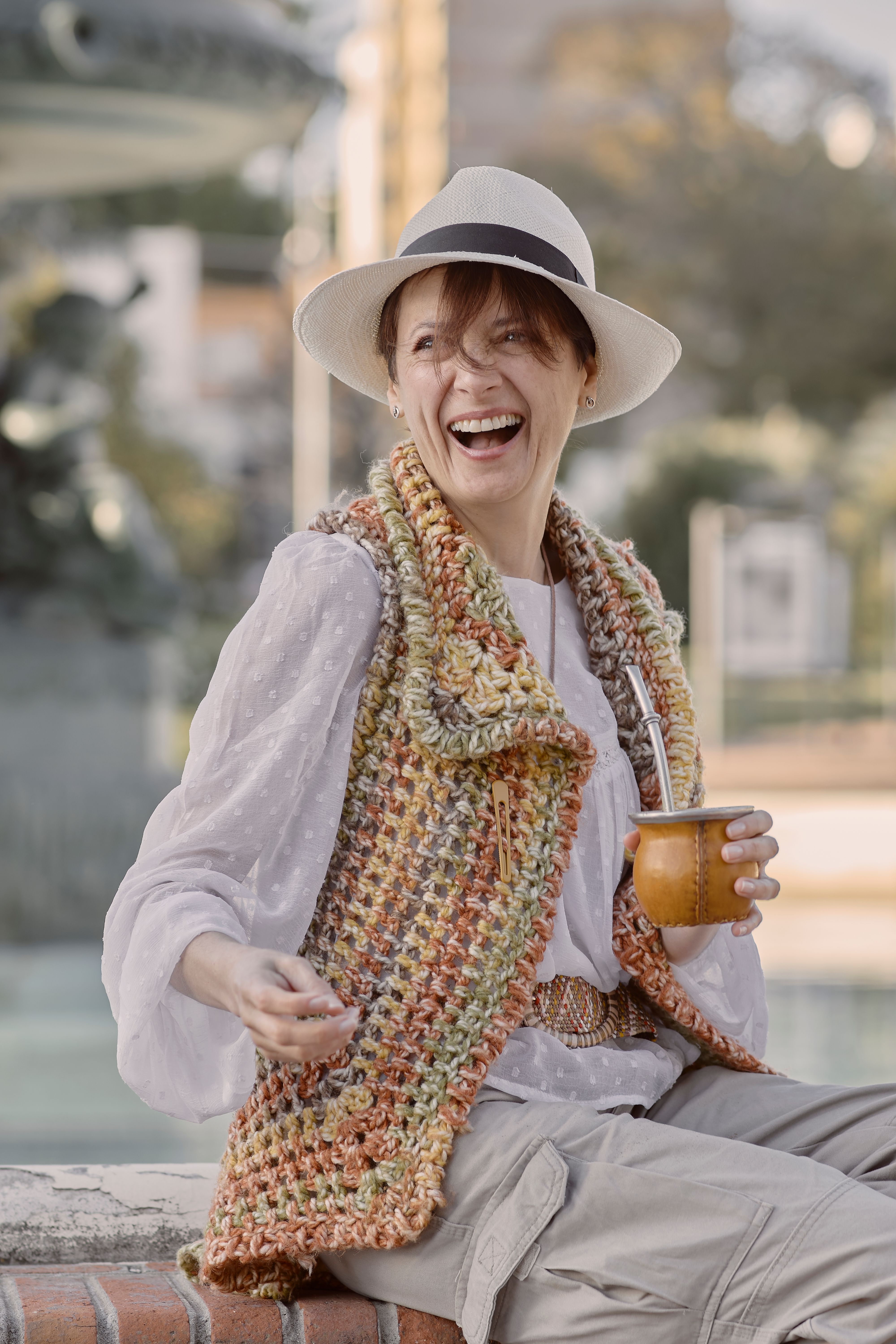 Happy Woman Enjoying Mate Outdoors in Montevideo · Free Stock Photo