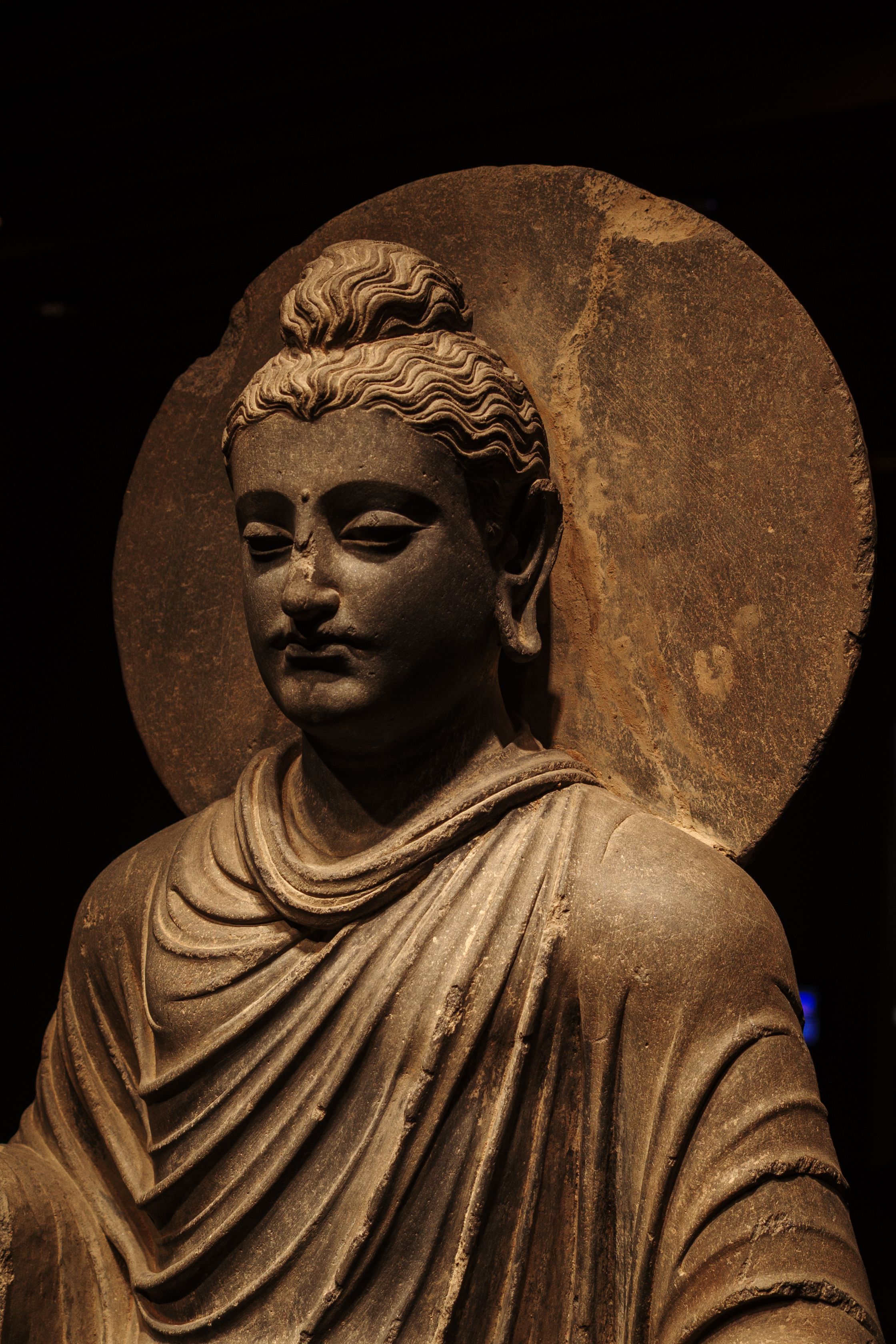 Ancient Buddha Sculpture with Halo · Free Stock Photo