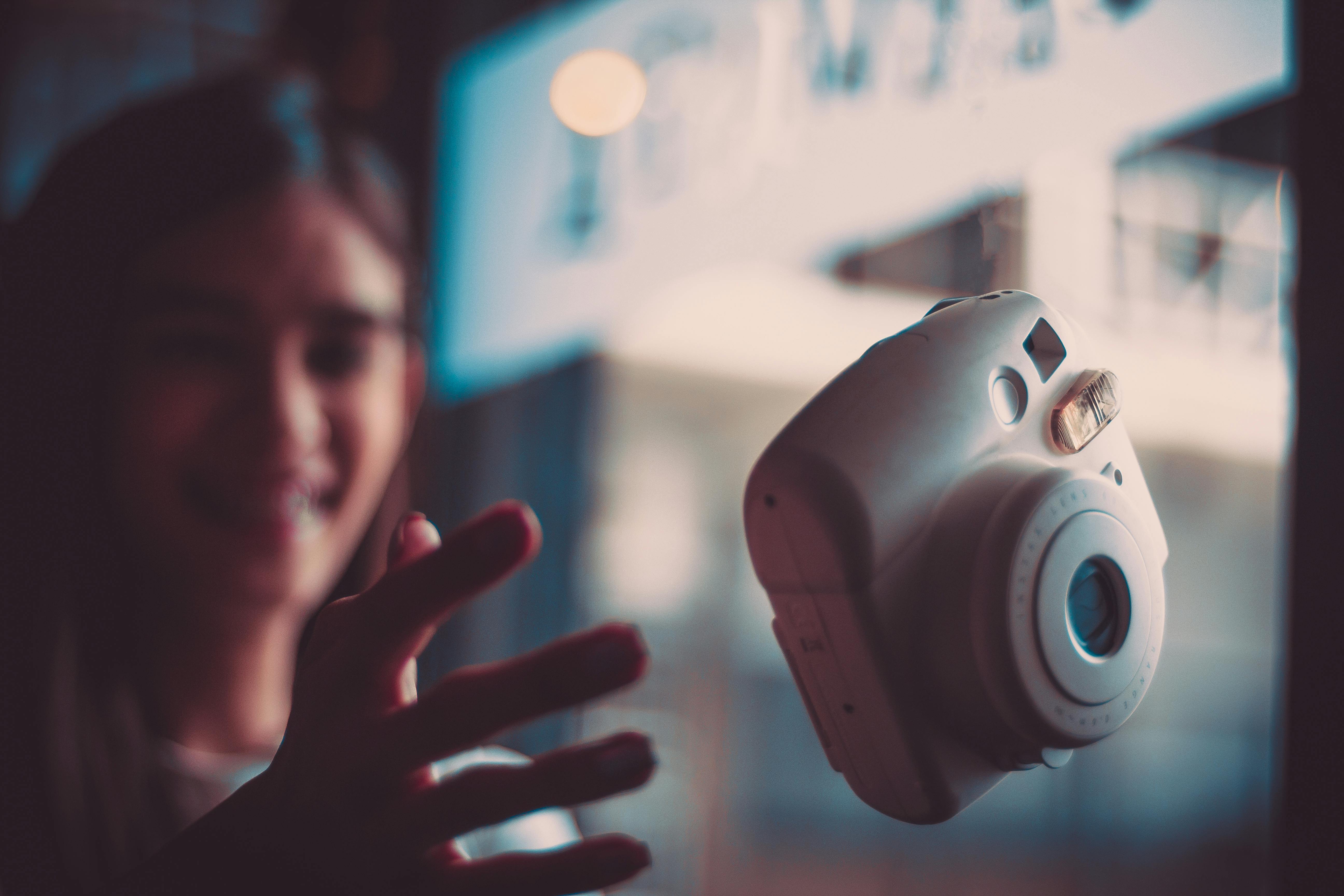 Floating Instant Camera · Free Stock Photo