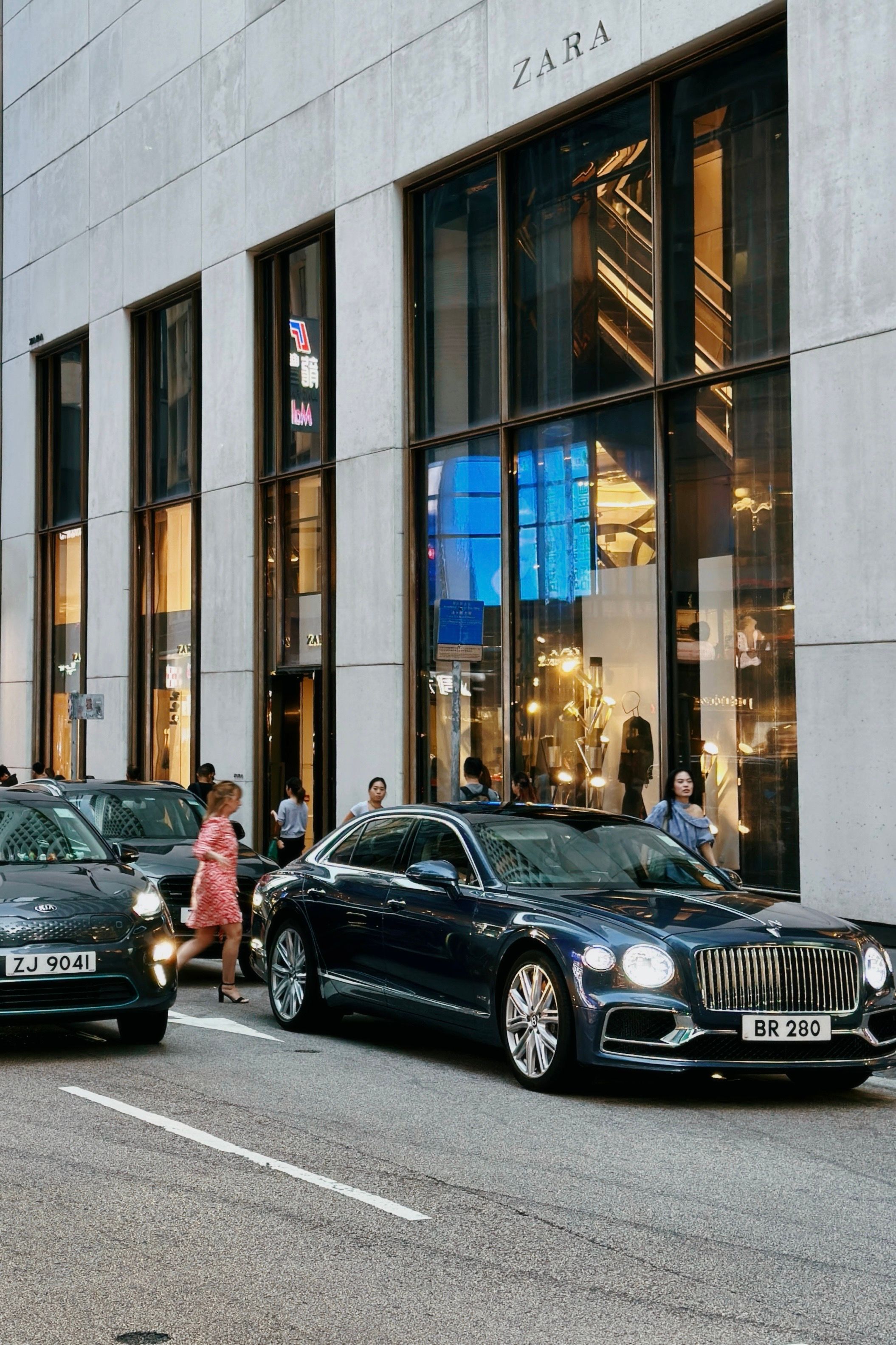 Luxury Cars Parked Outside Fashion Store · Free Stock Photo
