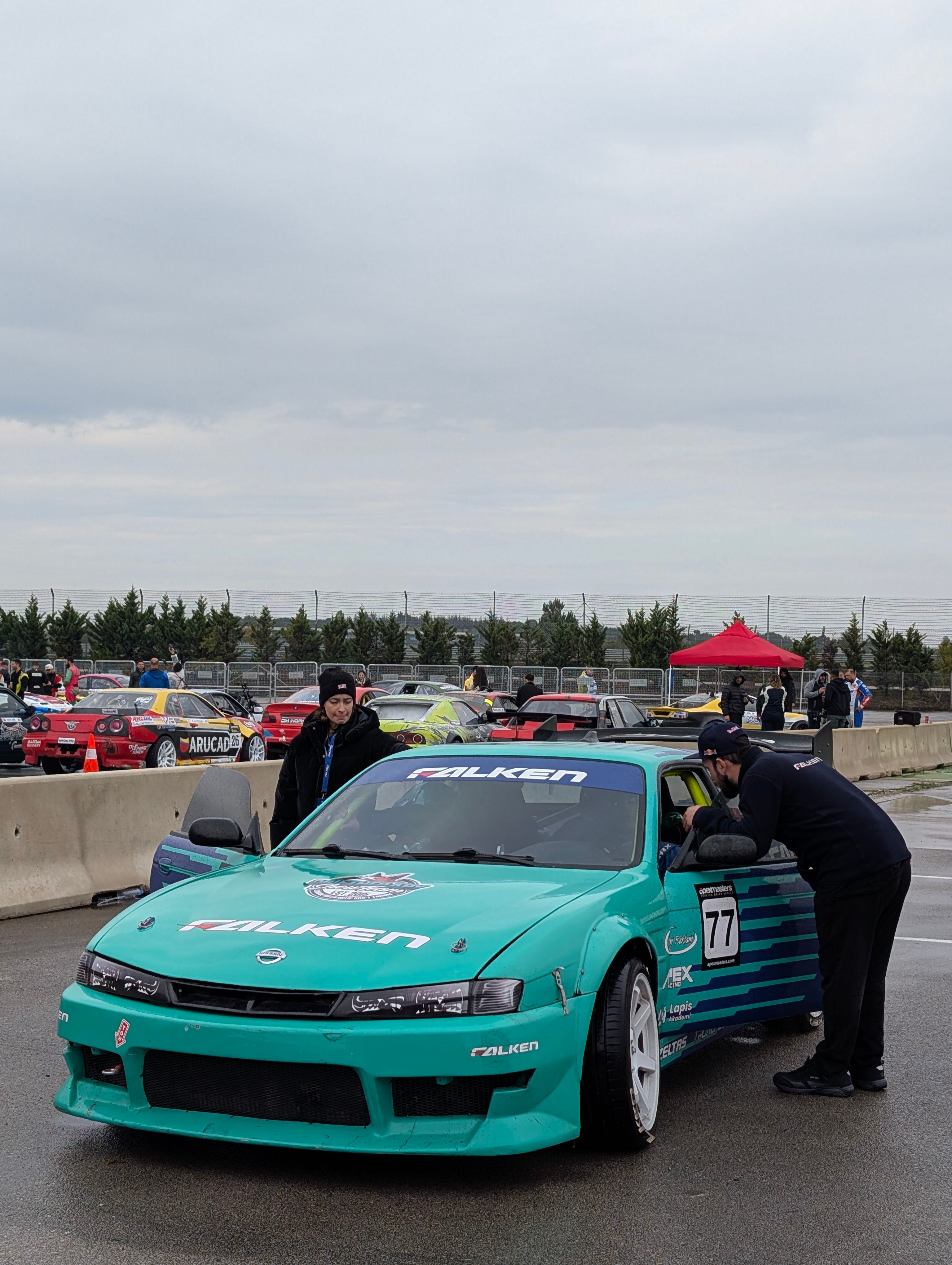 High-Speed Drifting Car Event Pit Stop · Free Stock Photo