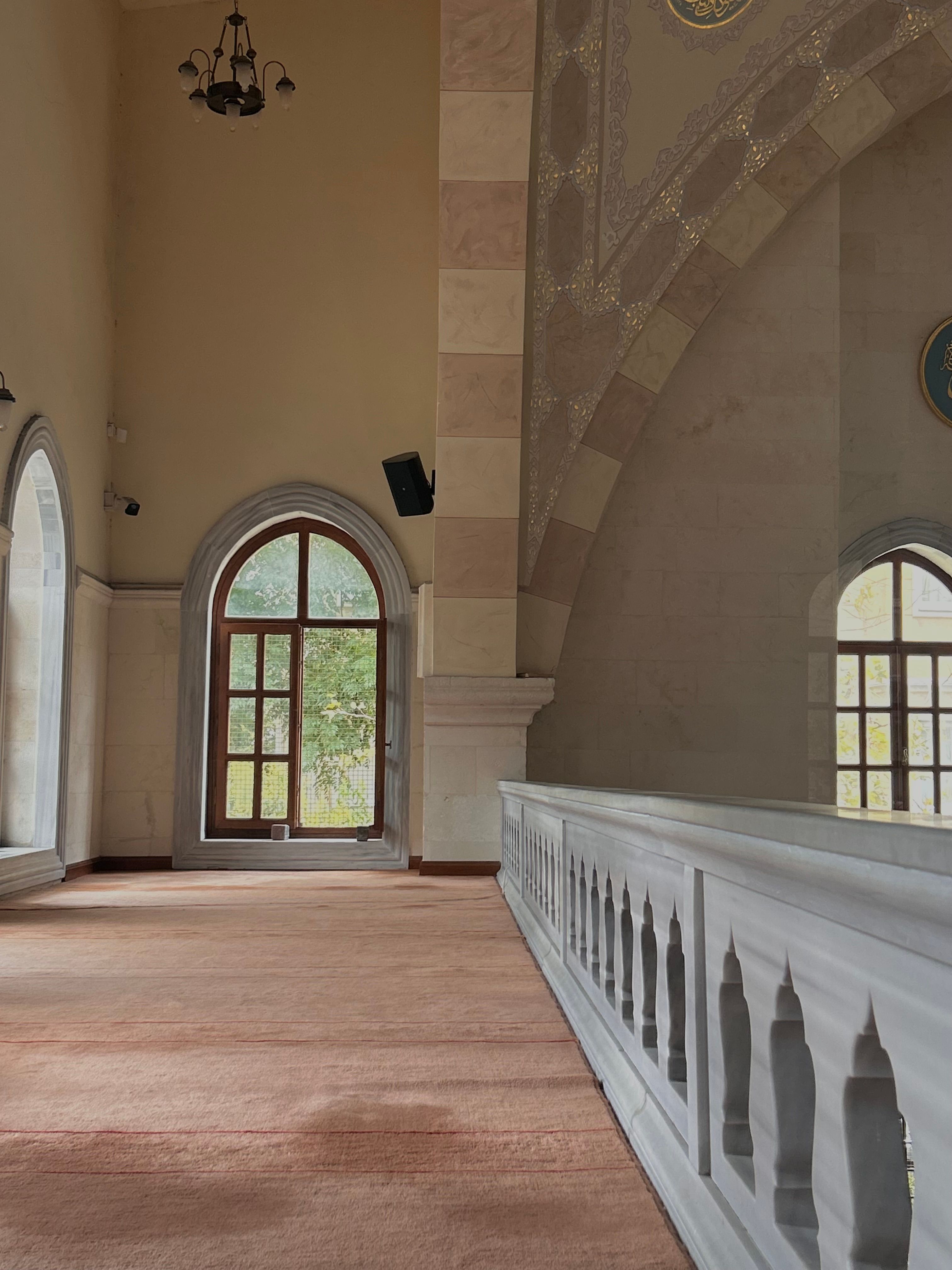 Sunlit Interior of an Elegant Hallway with Arched Windows · Free Stock ...