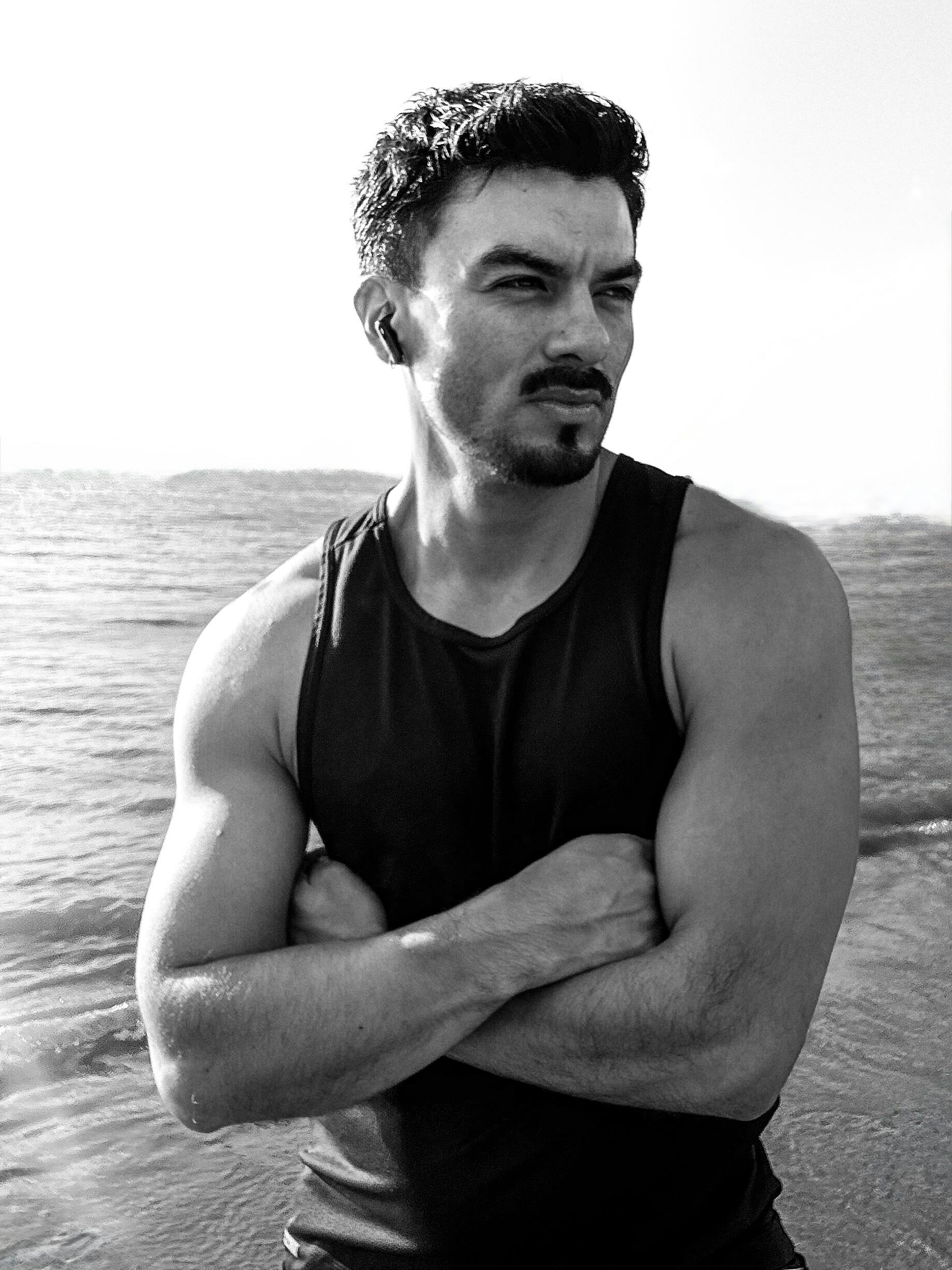 Strong Male Model at Porto Alegre Beach · Free Stock Photo