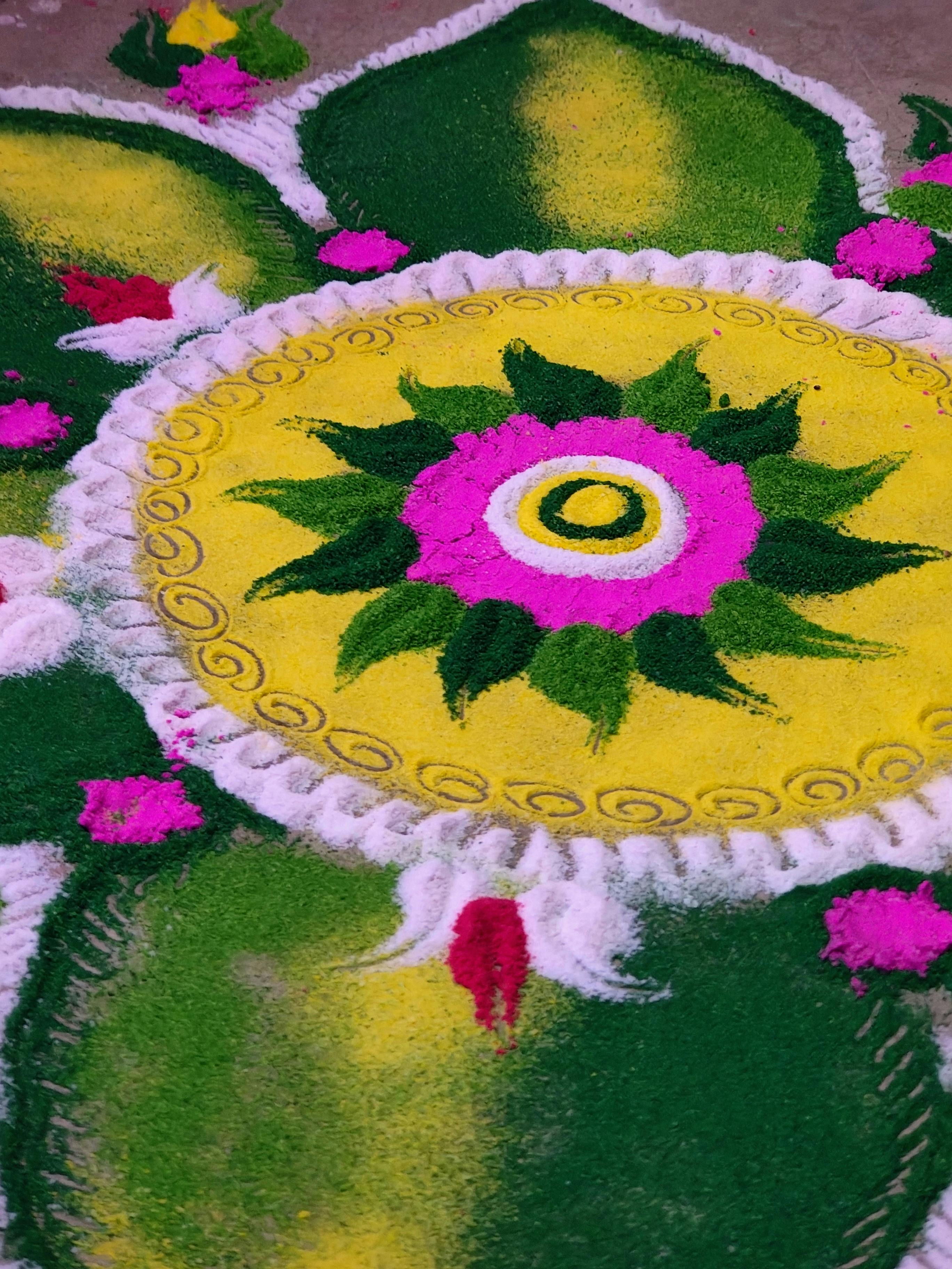 Vibrant Rangoli Design with Floral Patterns · Free Stock Photo