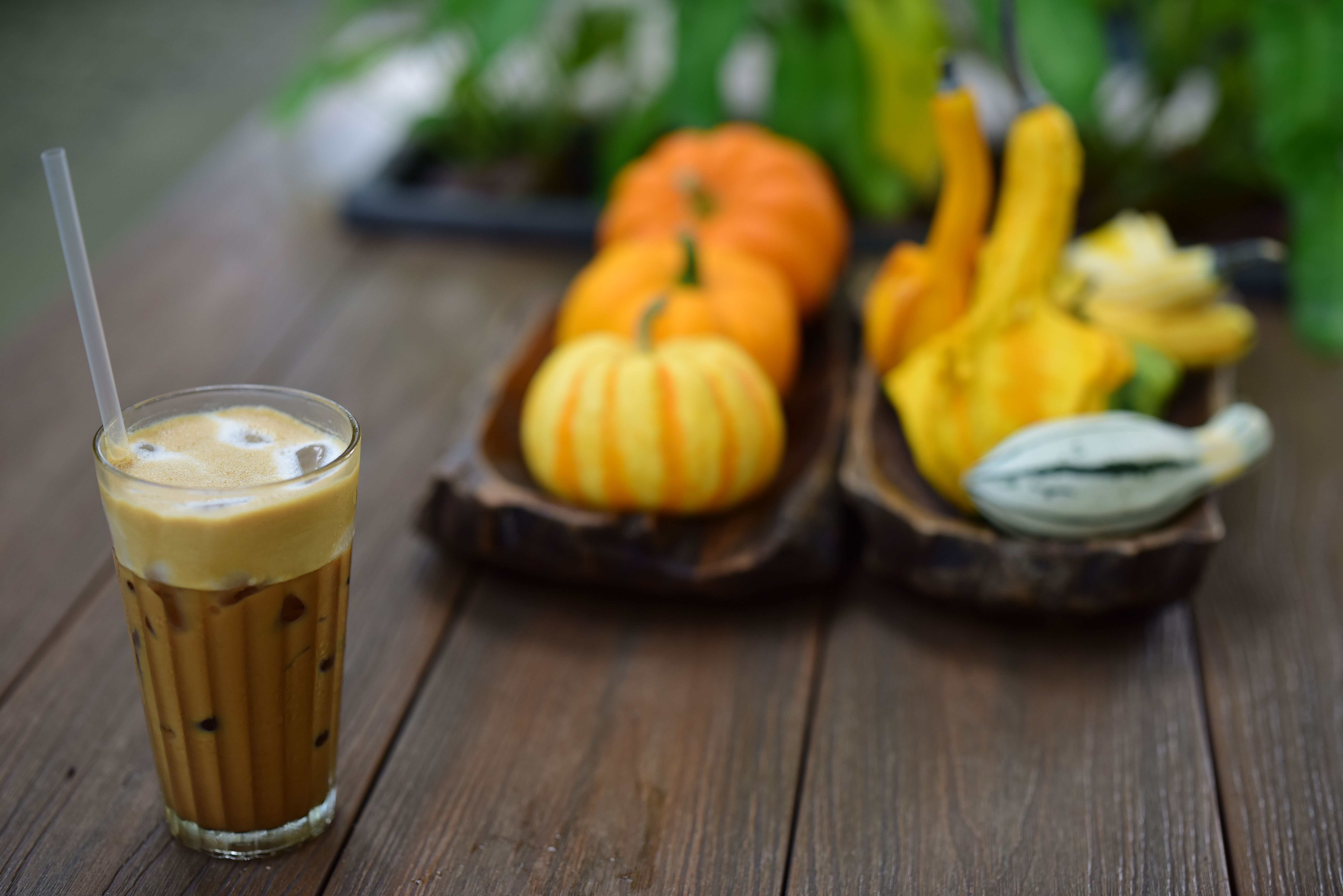 Iced Coffee with Decorative Autumn Gourds · Free Stock Photo