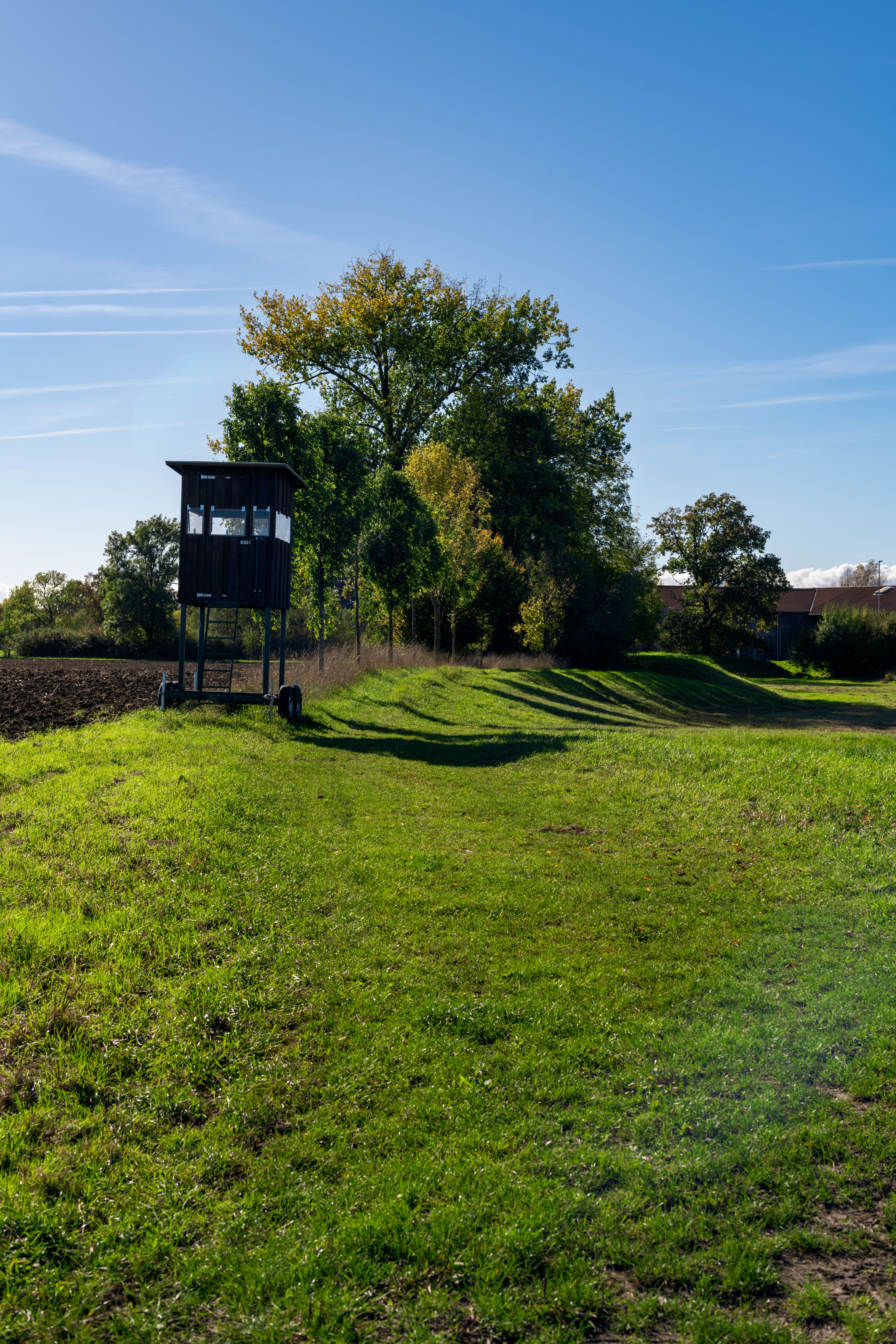 Scenic Countryside View with Hunting Structure · Free Stock Photo