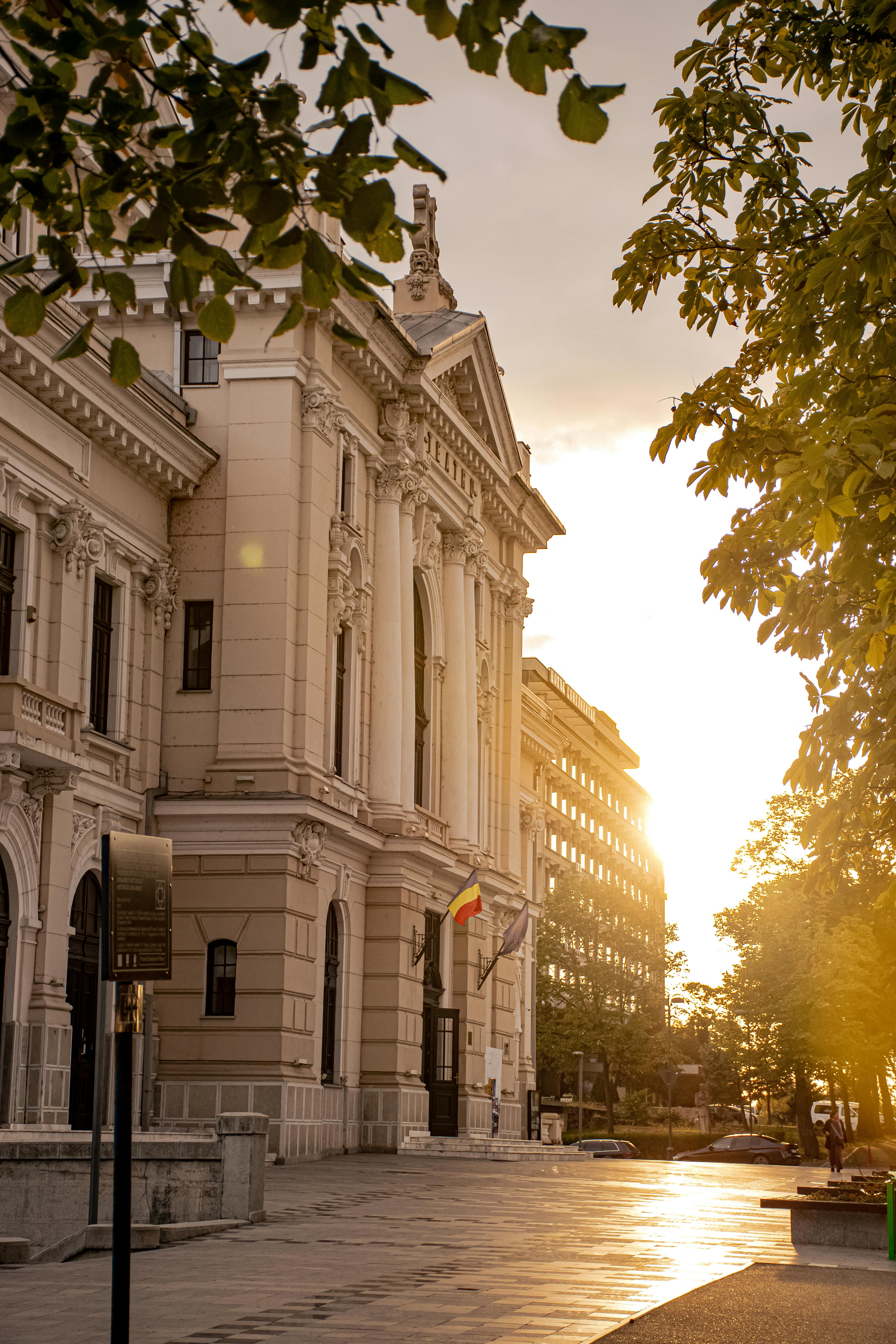 Sunlit Historic Building at Golden Hour · Free Stock Photo