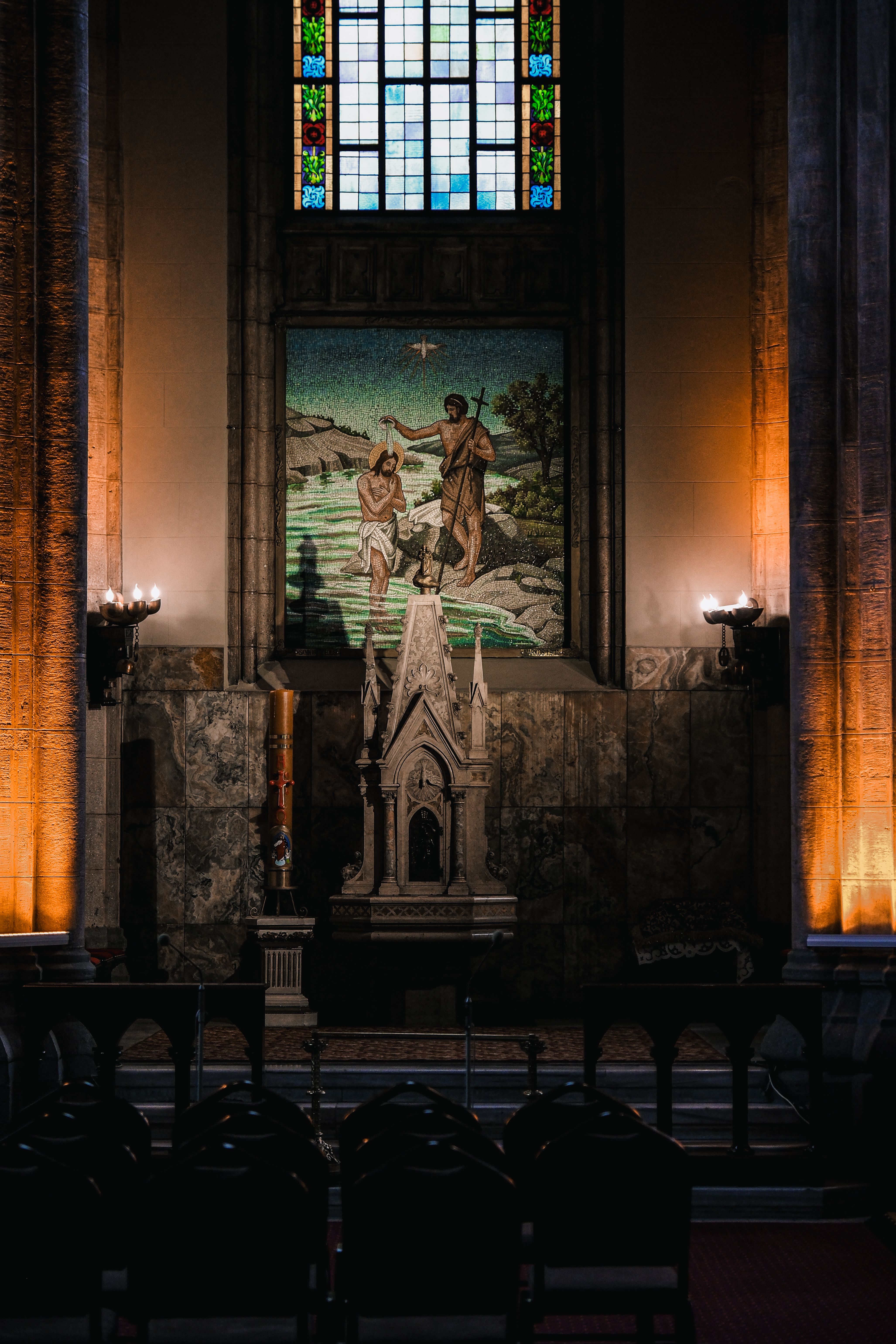 Intricate Church Interior with Stained Glass and Mural · Free Stock Photo