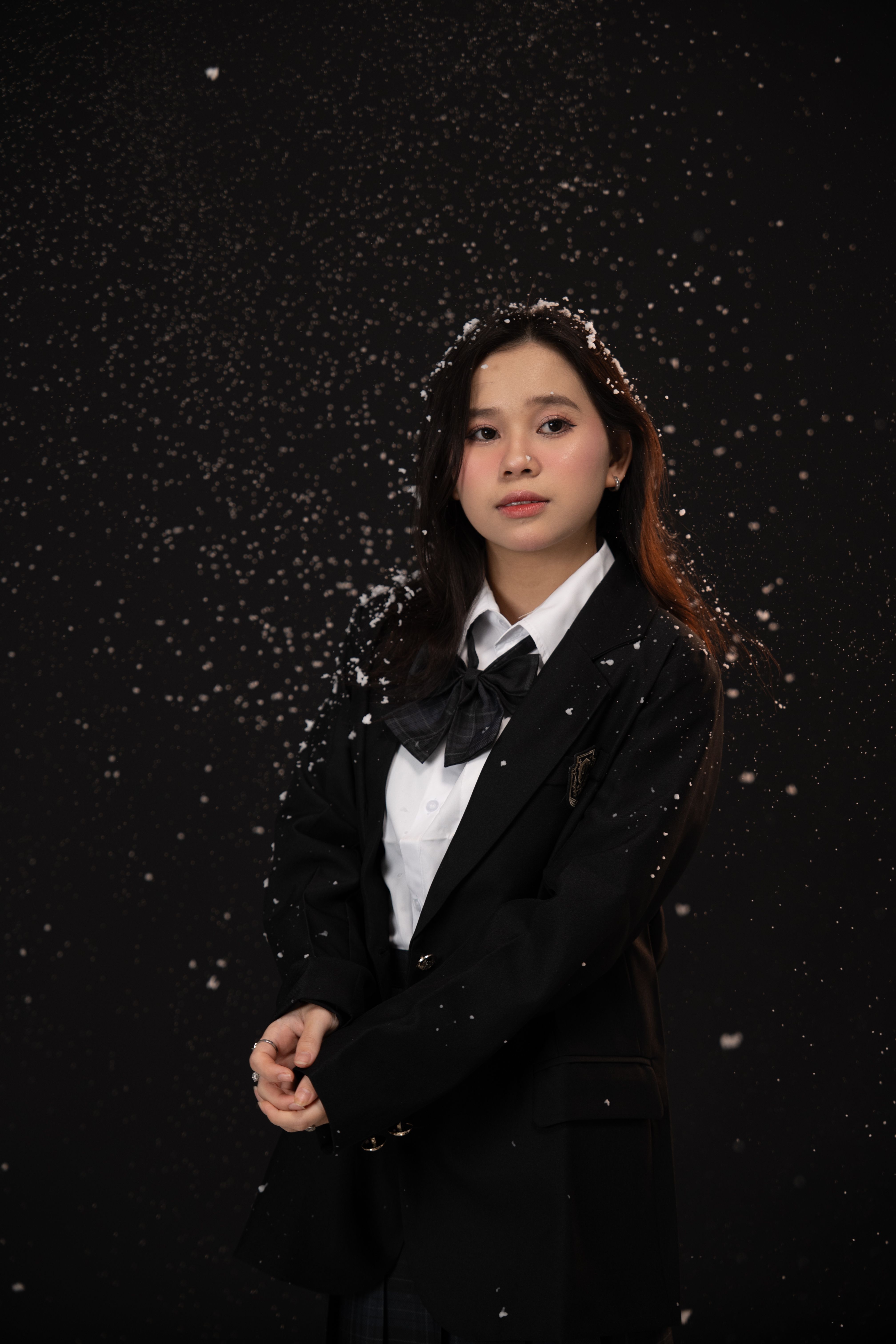 Elegant Portrait of Young Woman in Formal Attire · Free Stock Photo