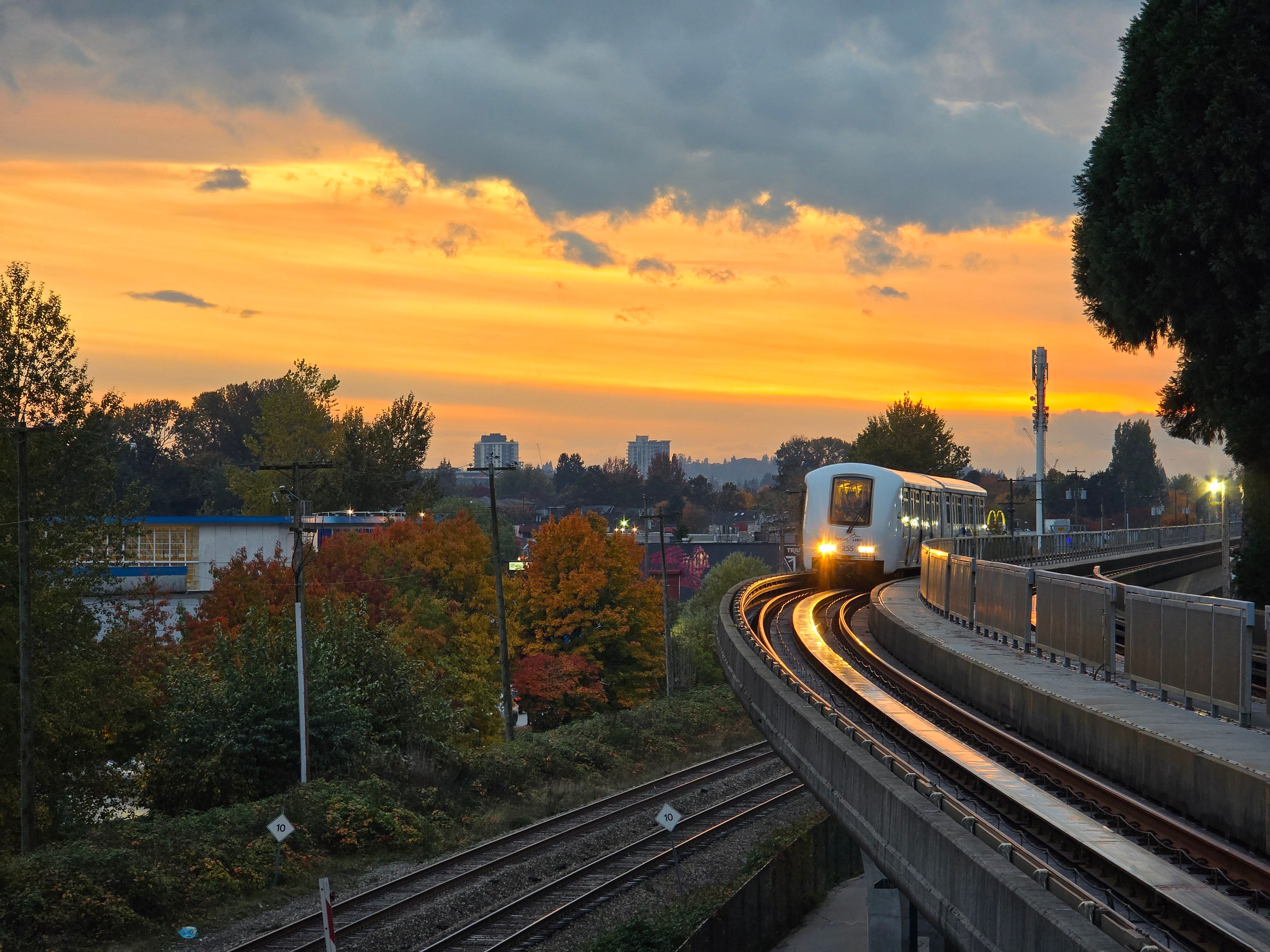 SkyTrain in Vancouver at Sunset Over Tracks · Free Stock Photo