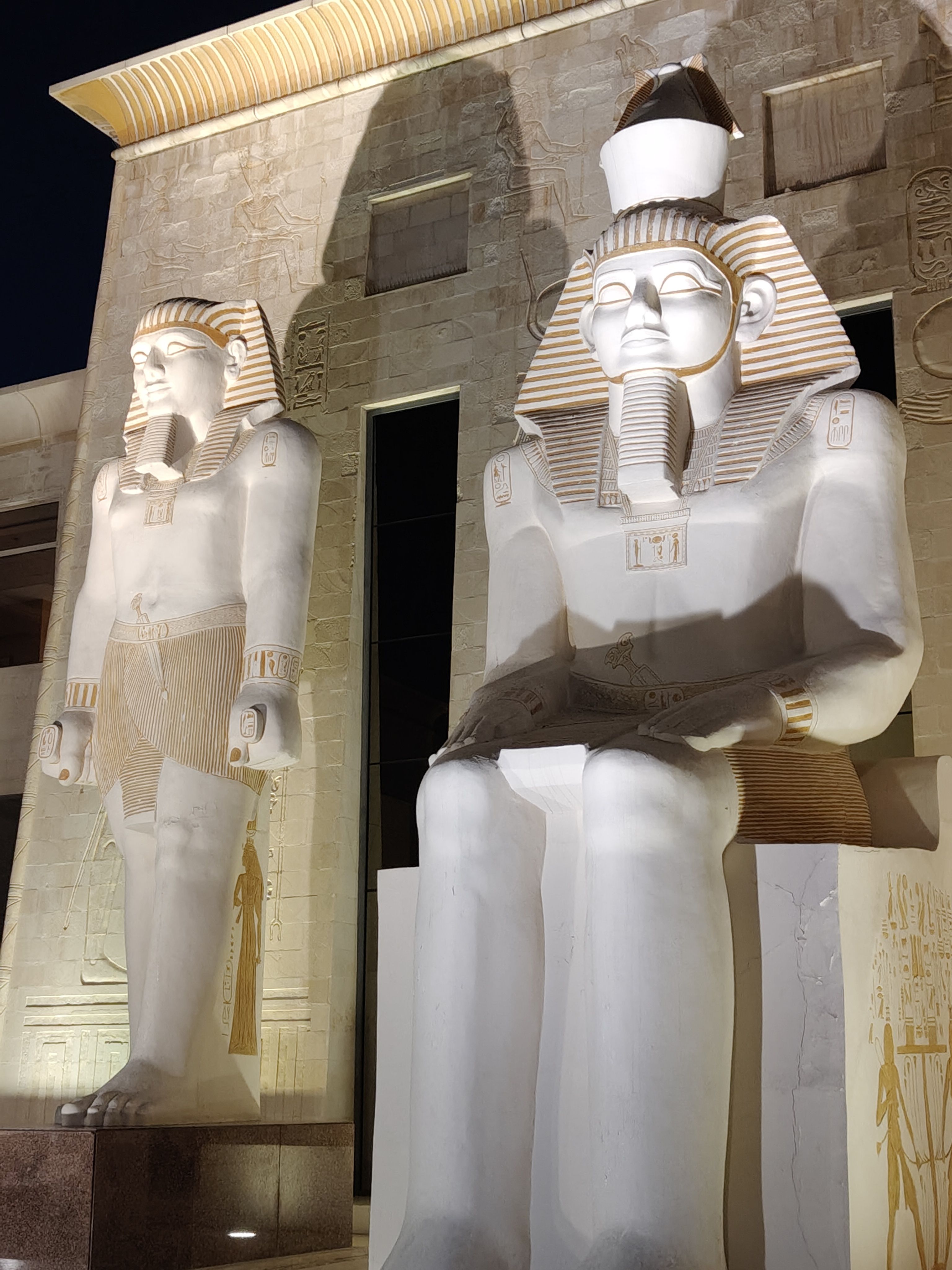 Illuminated Egyptian Pharaoh Statues at Night · Free Stock Photo