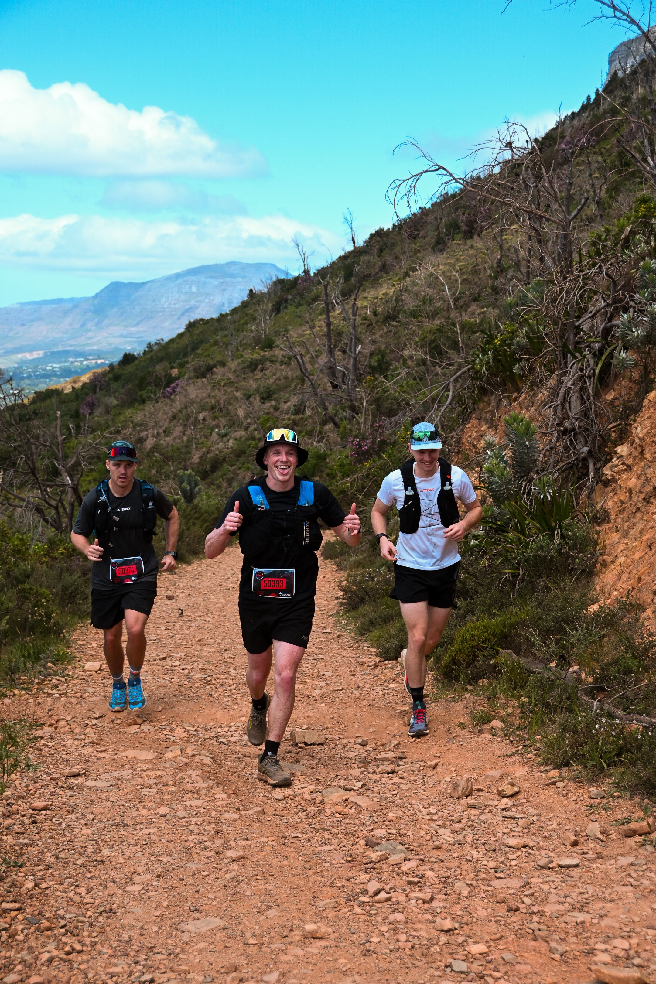 Energetic Trail Runners in Cape Town's Scenic Landscape · Free Stock Photo