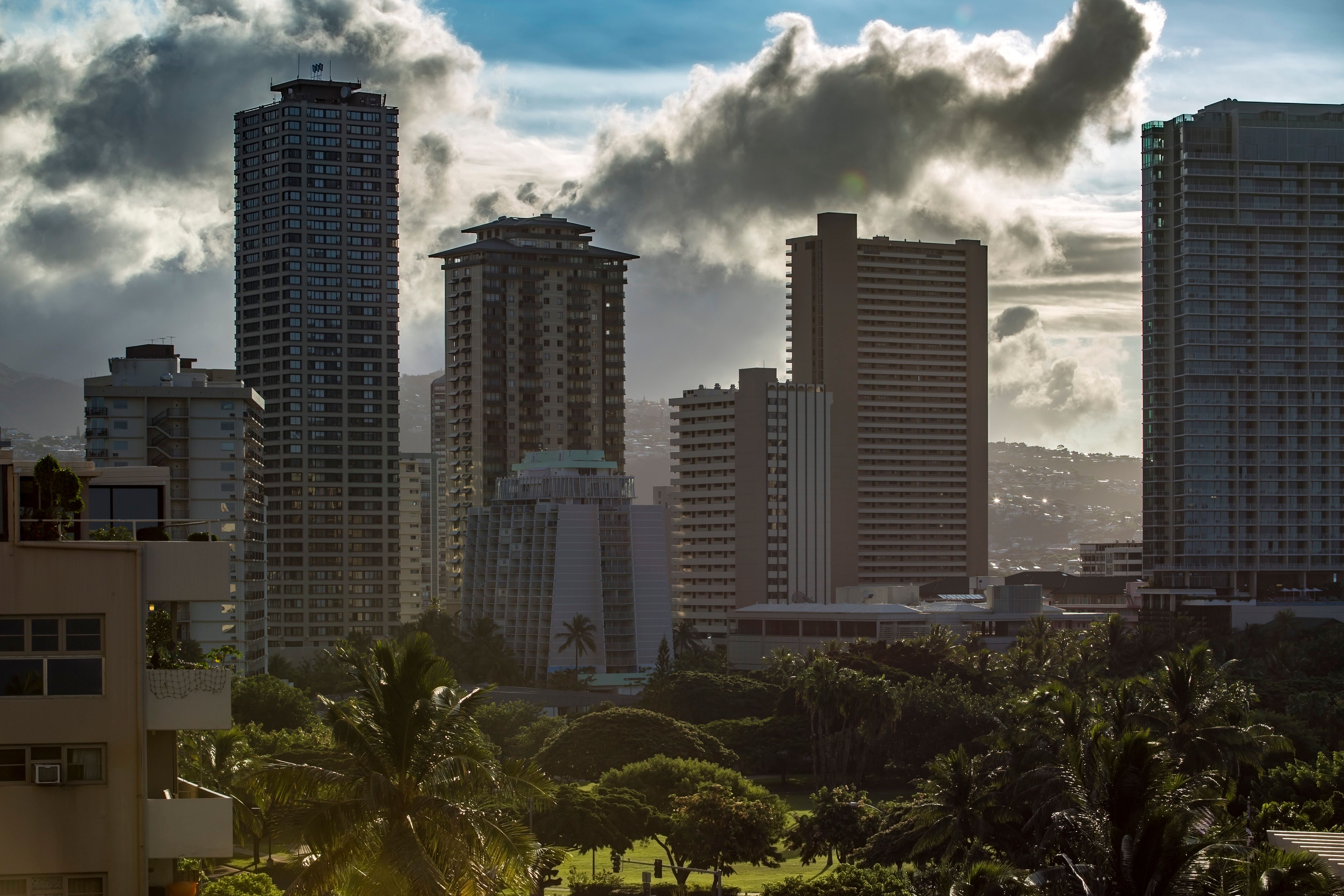 Skyscrapers in Tropical Cityscape at Dawn · Free Stock Photo