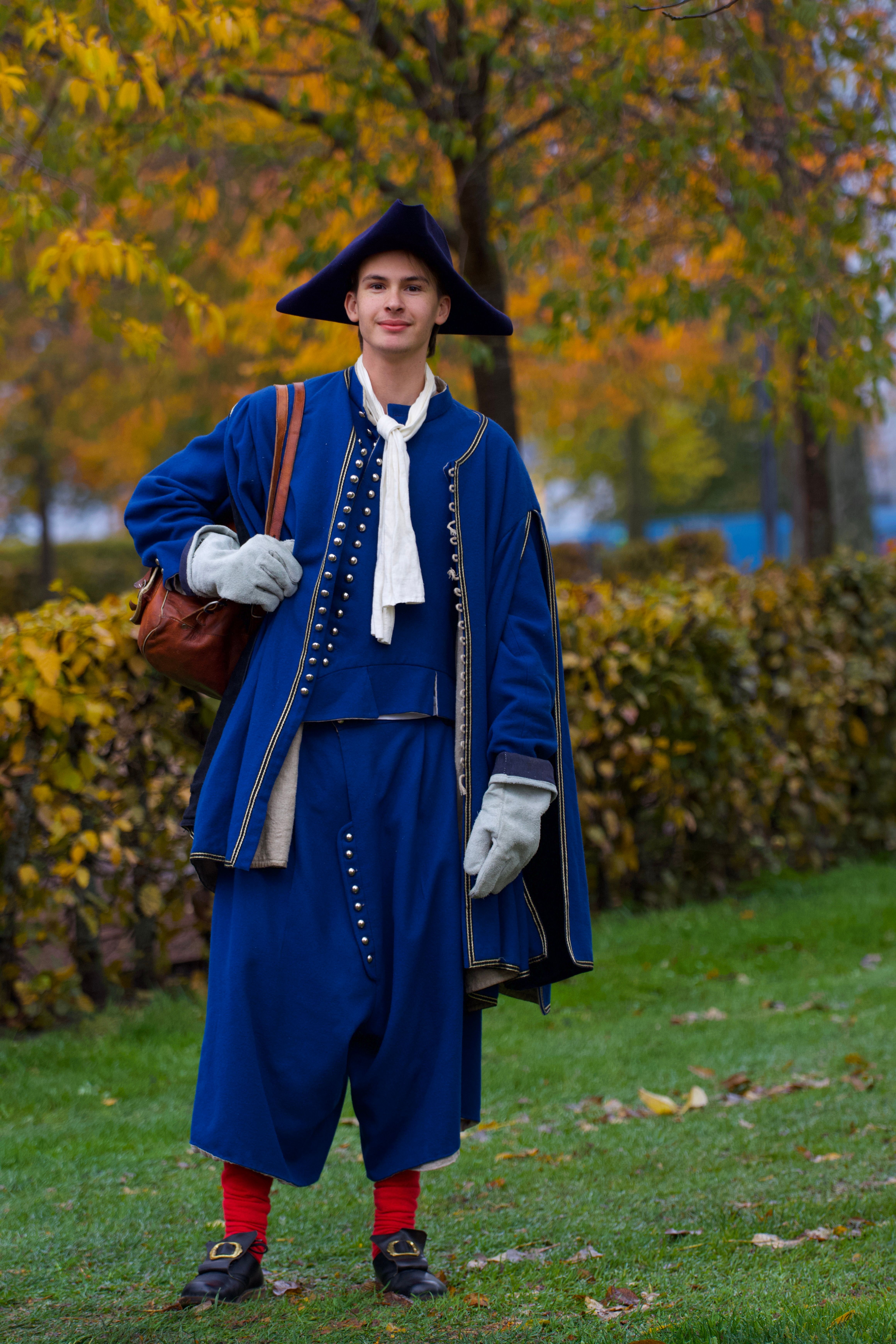 Traditional Swedish Costume in Autumn Setting · Free Stock Photo