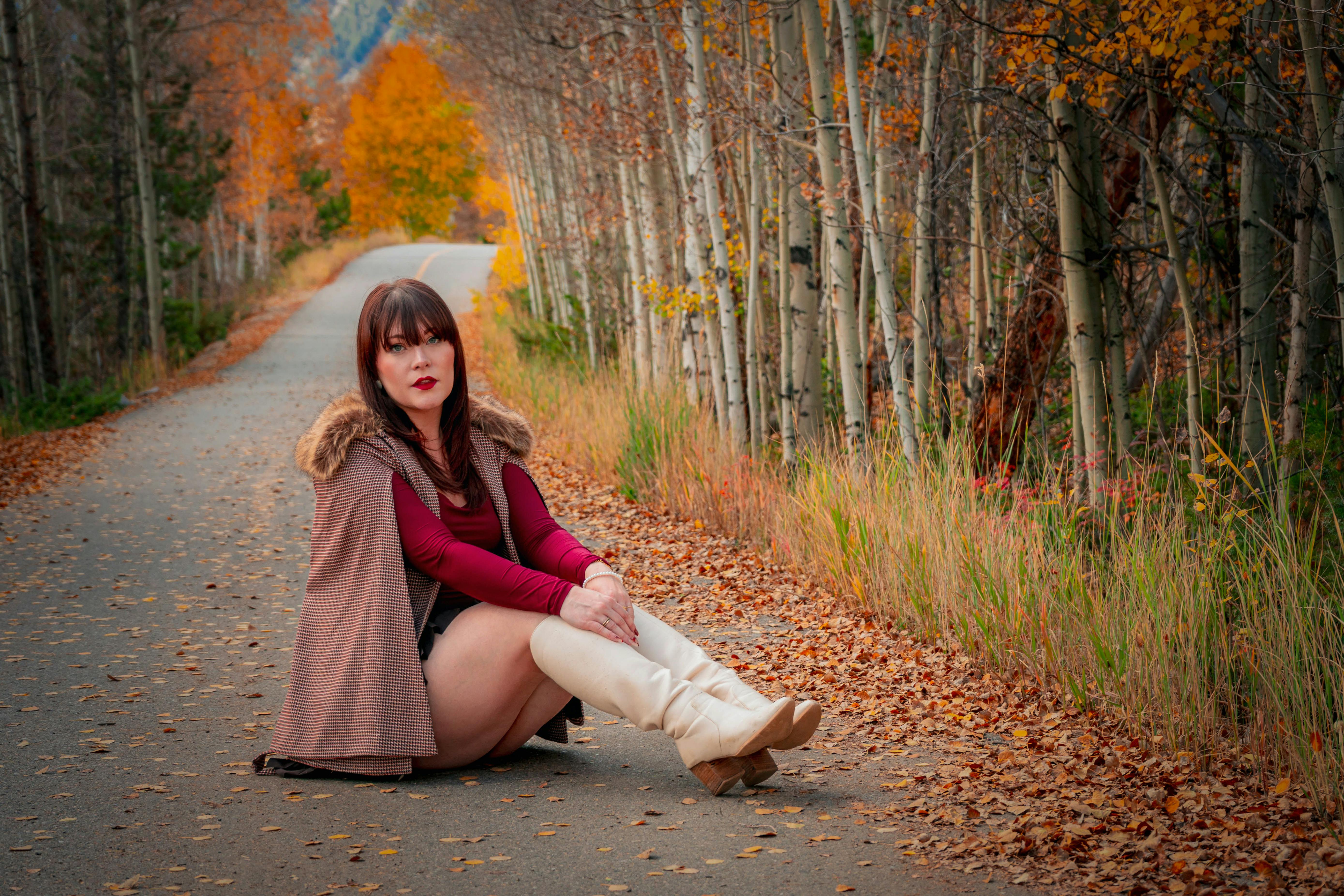 Stylish Portrait in Autumn Forest Pathway · Free Stock Photo