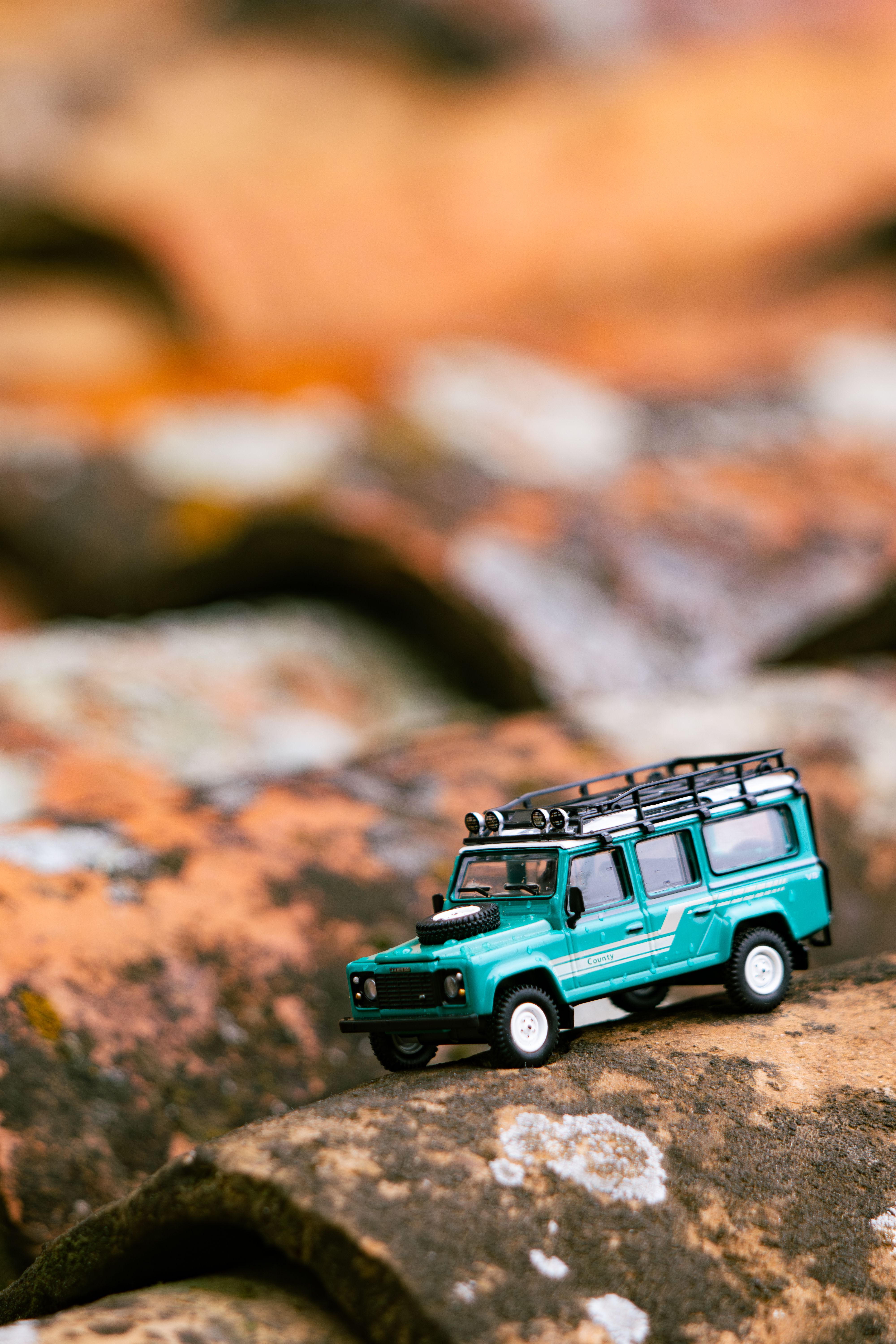 Miniature Land Rover on Rustic Roof Tiles · Free Stock Photo