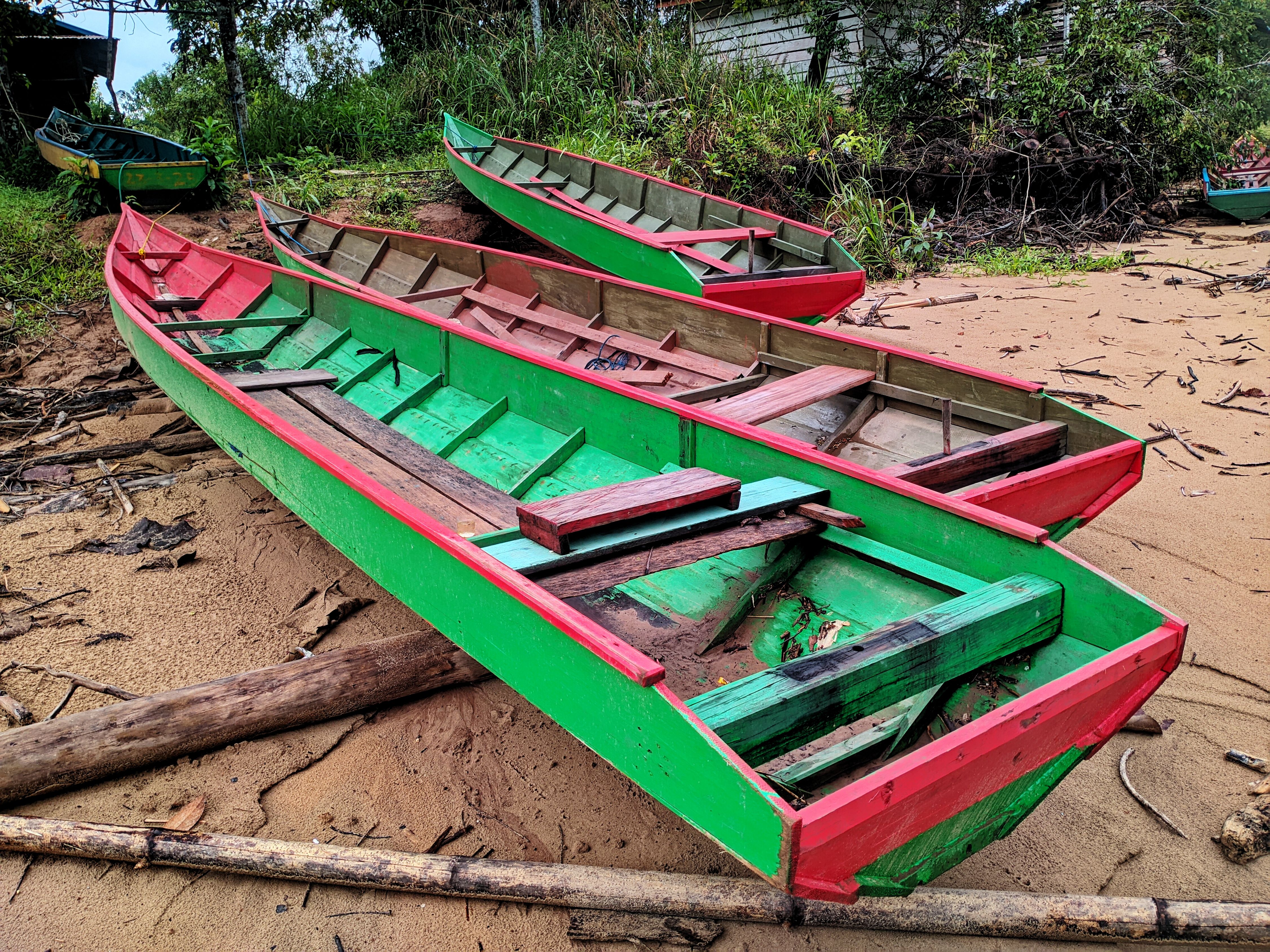 Colorful Traditional Boats on Kalimantan Riverbank · Free Stock Photo
