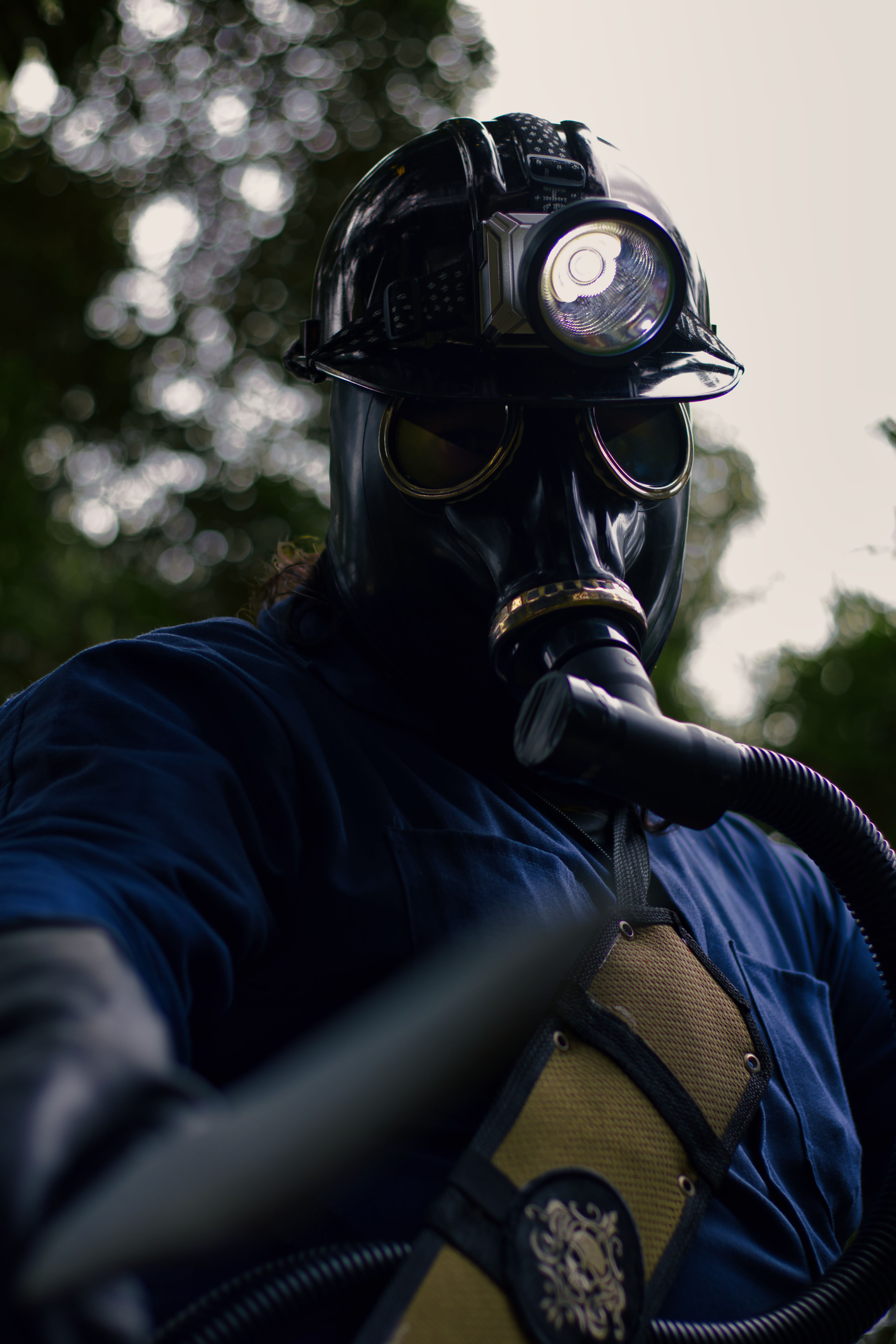 Mysterious Figure in Gas Mask Outdoor Portrait · Free Stock Photo