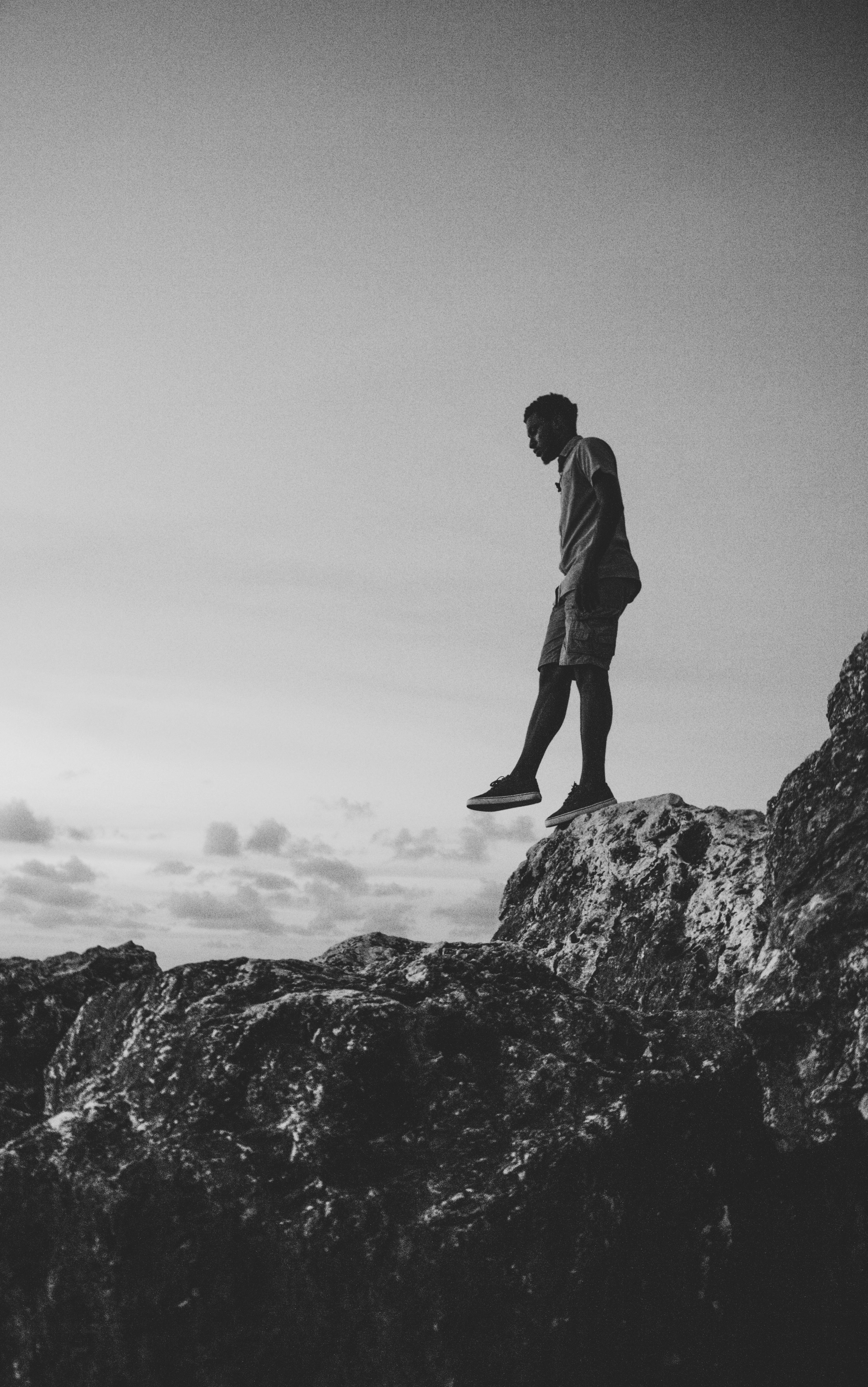 Man Standing on Cliff · Free Stock Photo