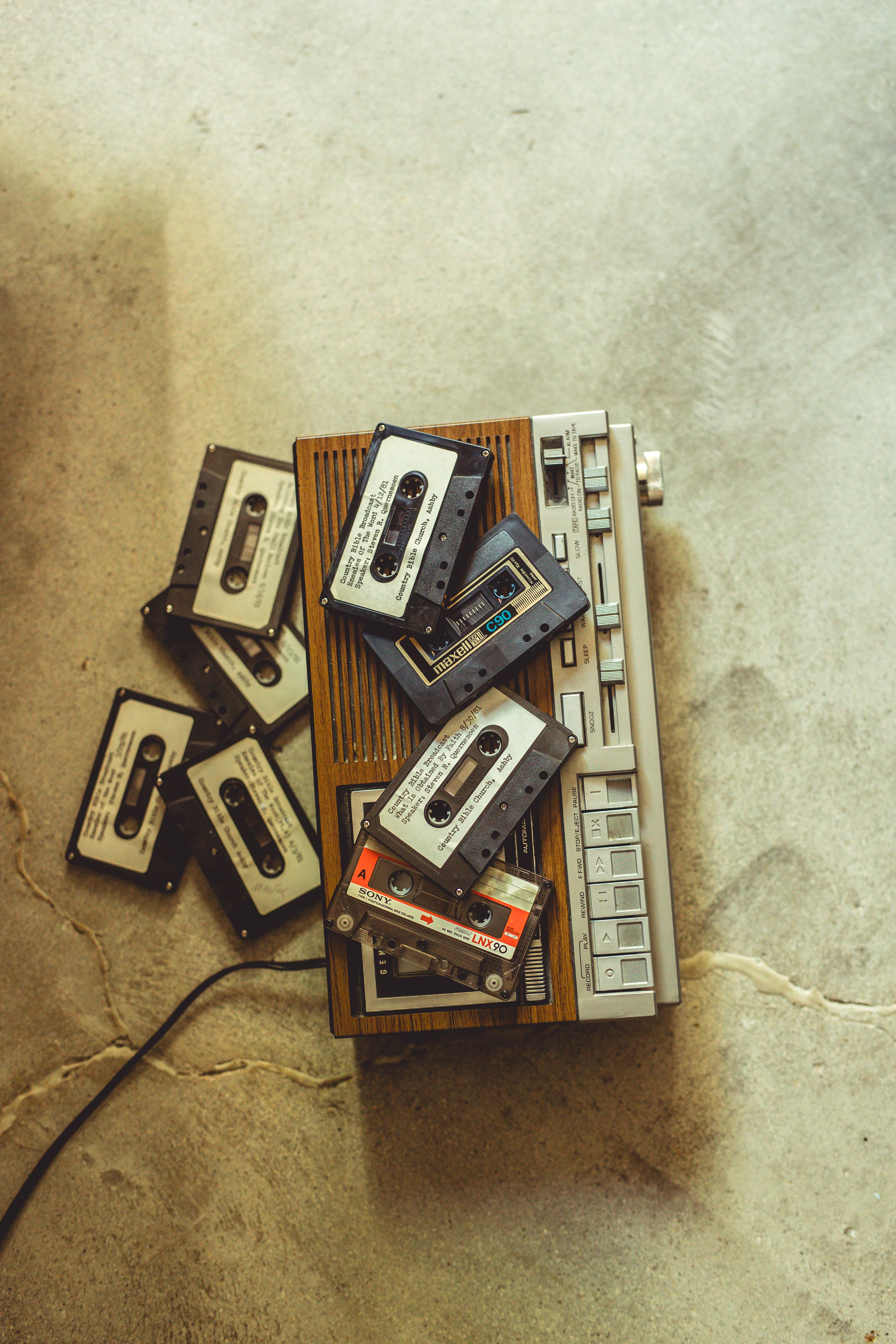 Vintage Cassette Tapes on Retro Tape Deck · Free Stock Photo