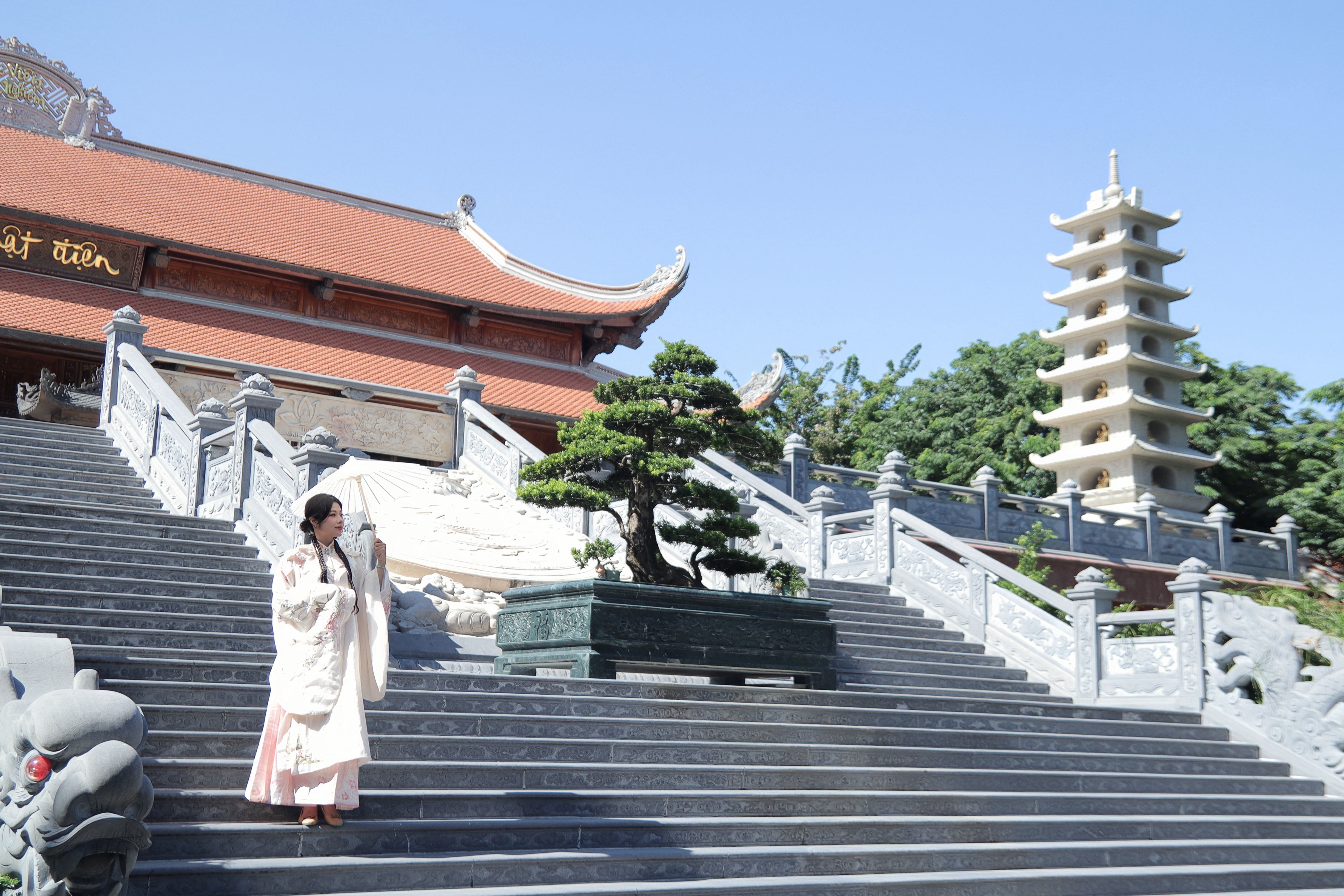 Traditional Temple with Woman in Hanfu on Stone Stairs · Free Stock Photo