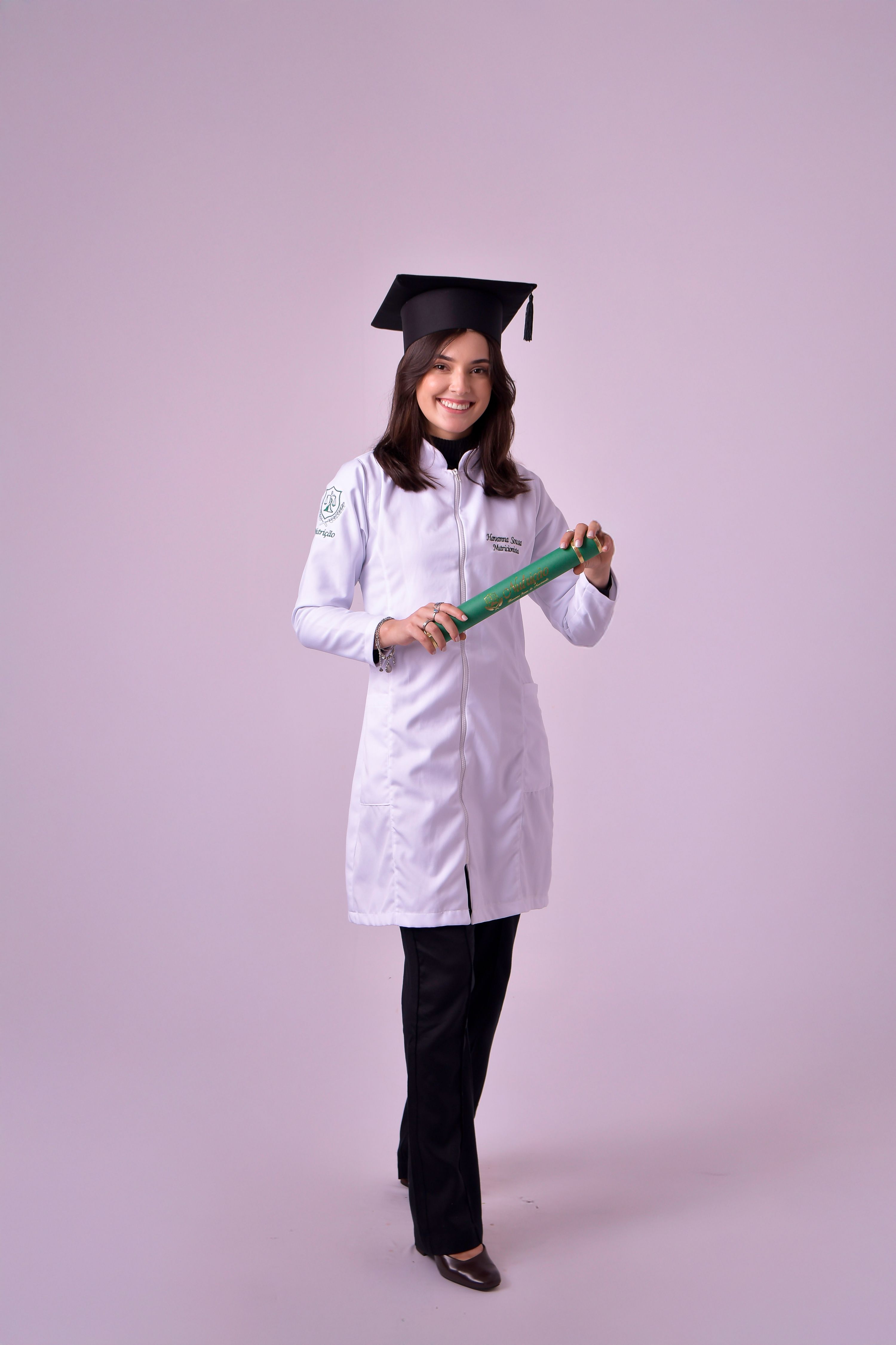 Young Graduate in White Coat with Diploma · Free Stock Photo