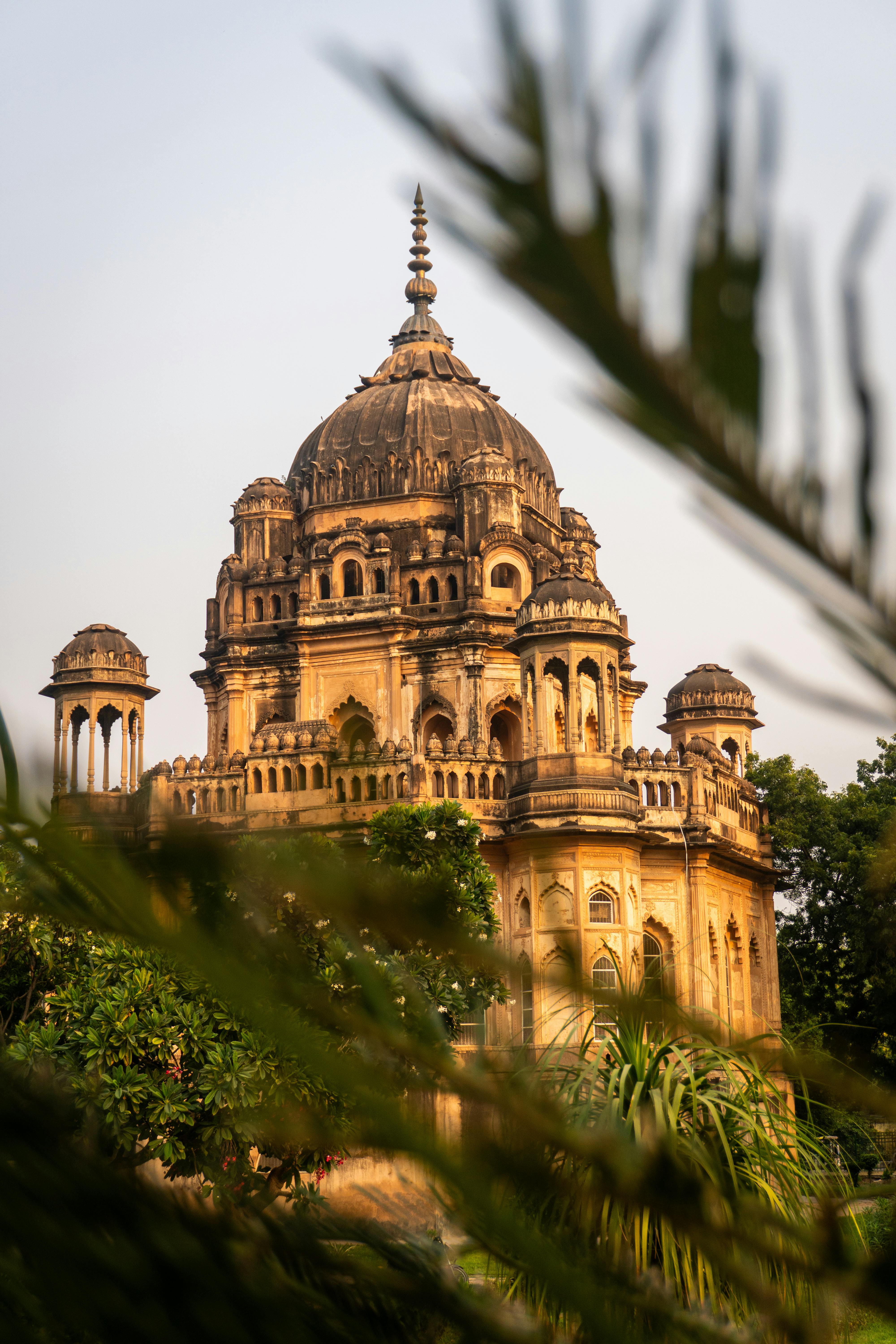 Lucknow's Historic Tomb Amidst Lush Greenery · Free Stock Photo