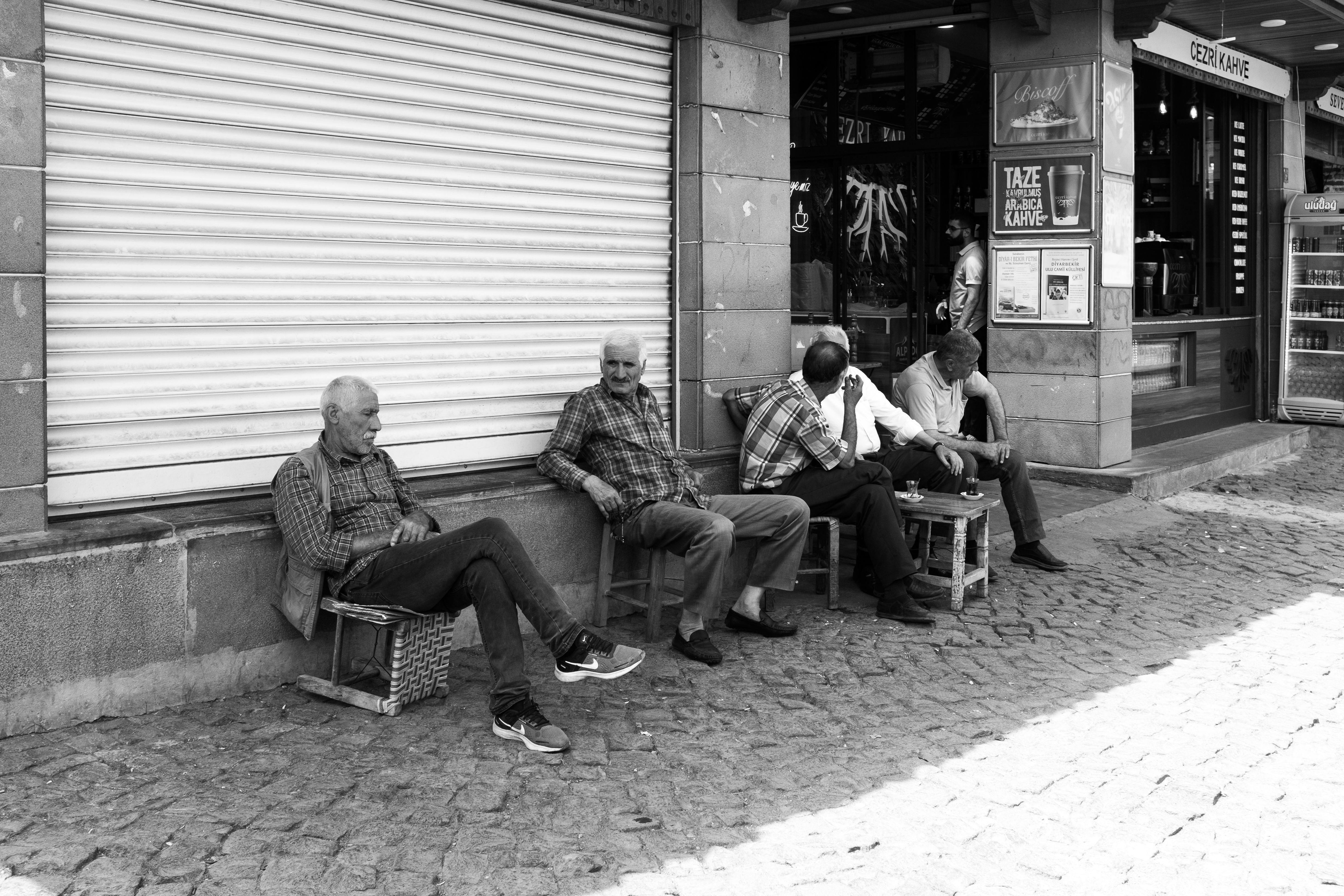 Senior Men Relaxing in Urban Street Scene · Free Stock Photo