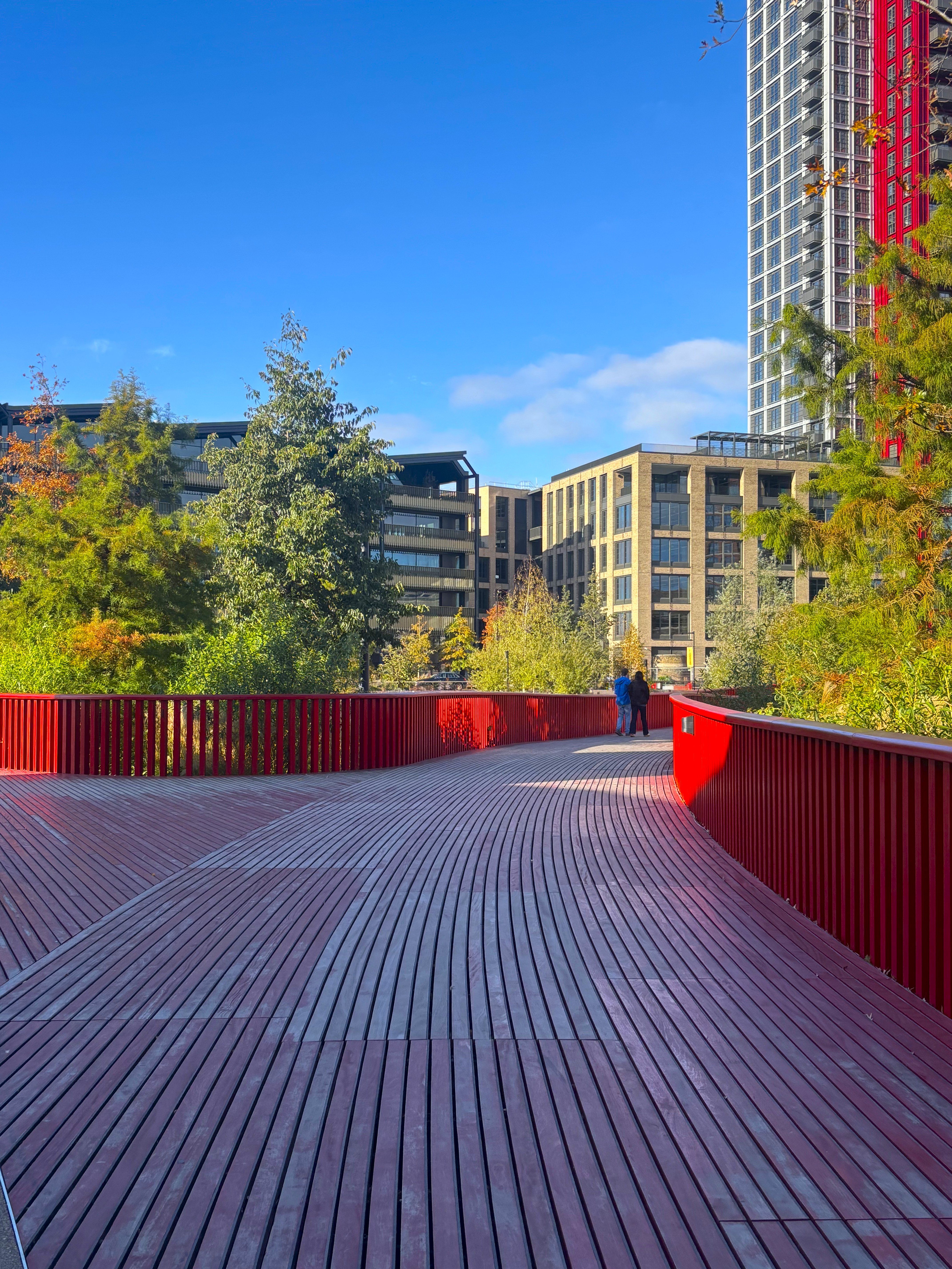 Vivid Red Footbridge in Urban English Park · Free Stock Photo