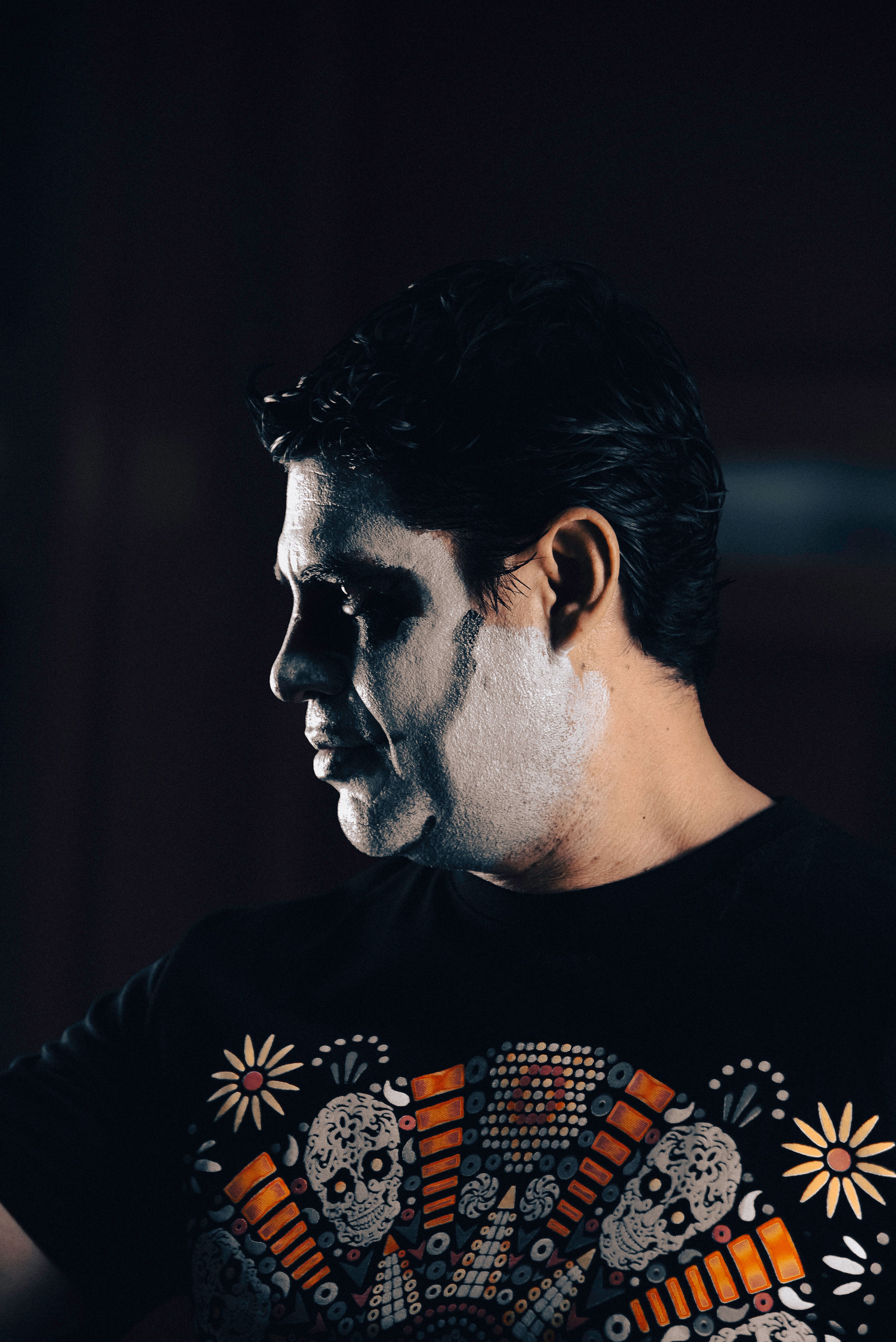 Dramatic Portrait of Man in Face Paint · Free Stock Photo