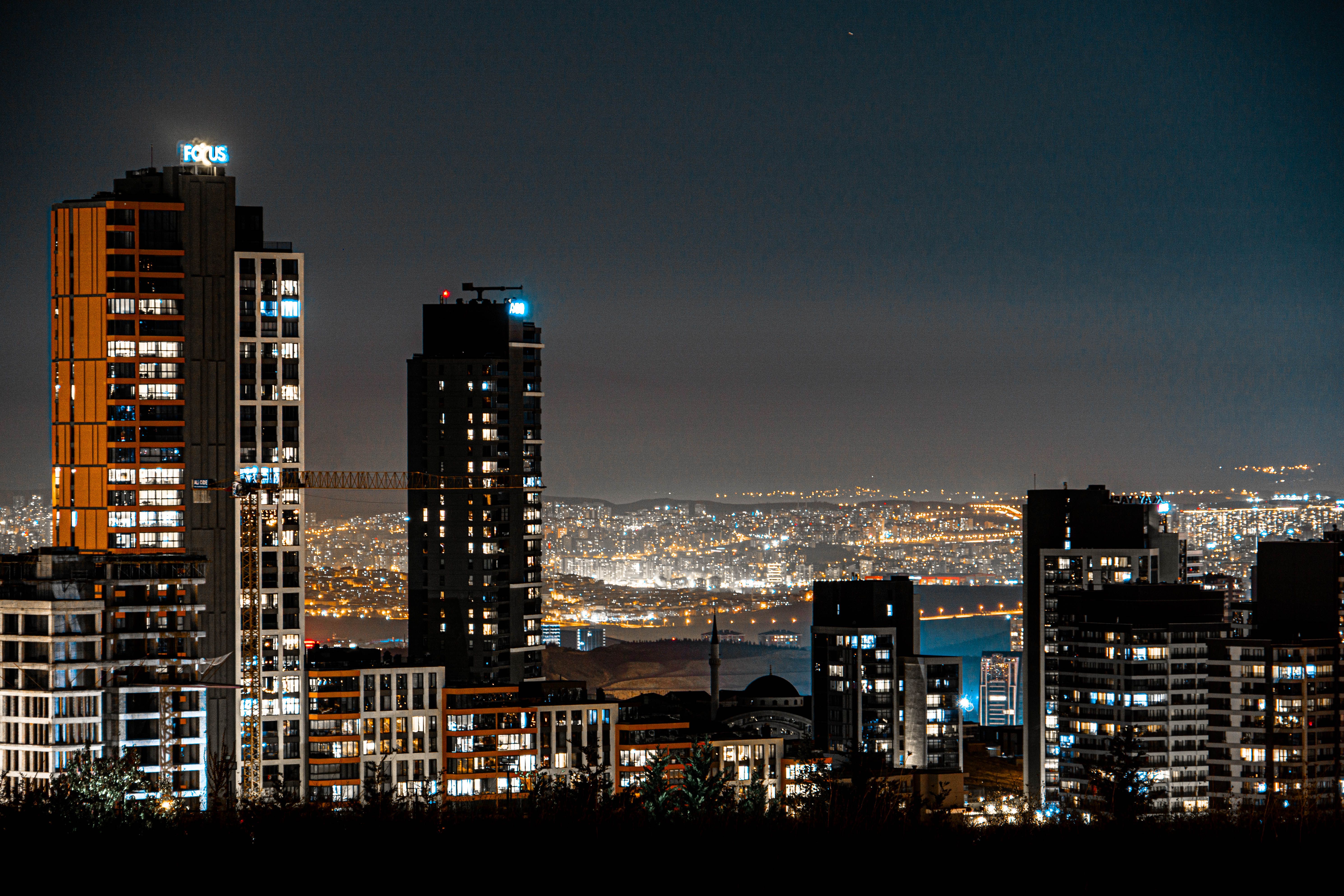 Stunning Urban Night Skyline with Skyscrapers · Free Stock Photo