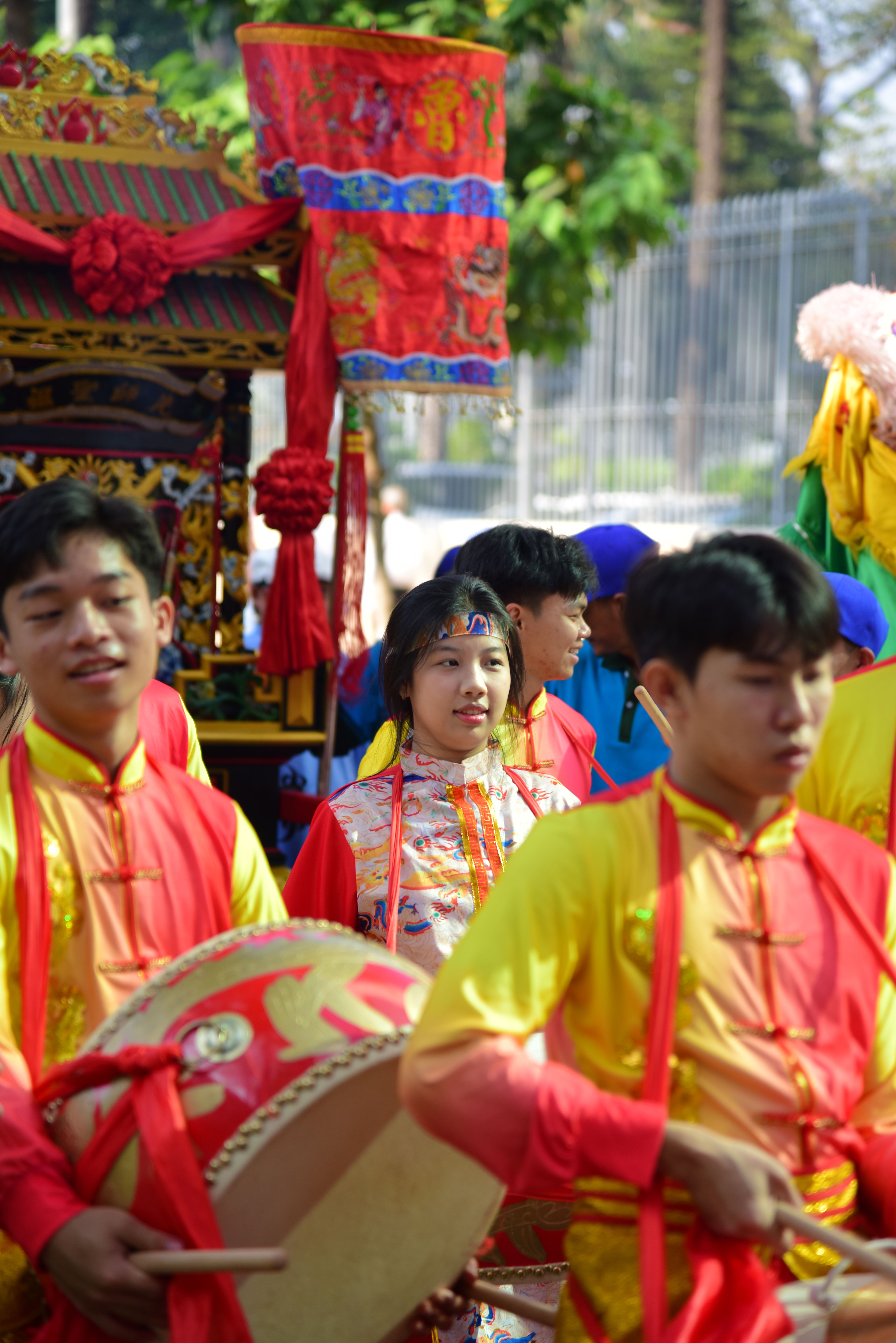 Vibrant Parade with Traditional Costumes and Drums · Free Stock Photo