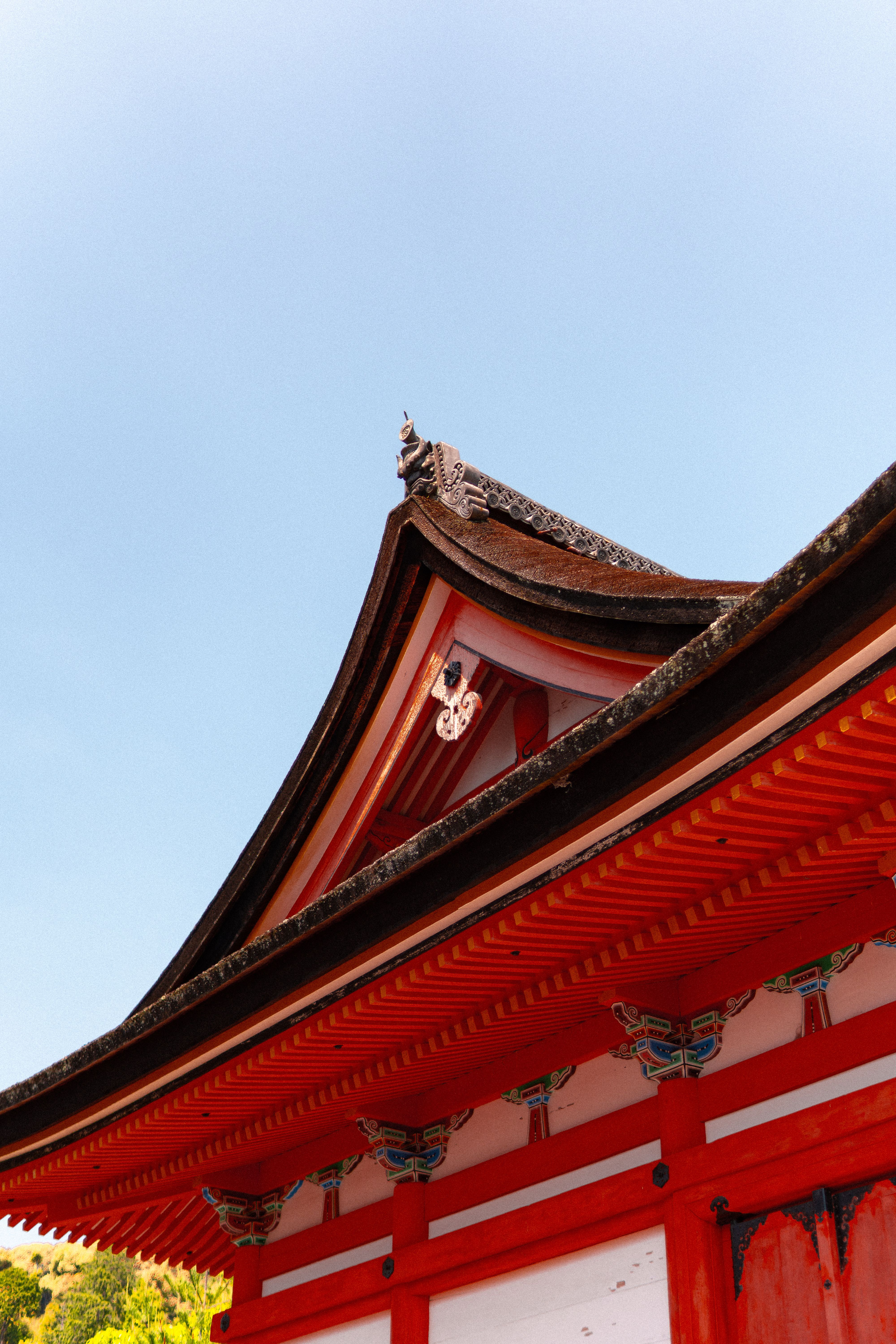 Traditional Japanese Temple Roof against Blue Sky · Free Stock Photo