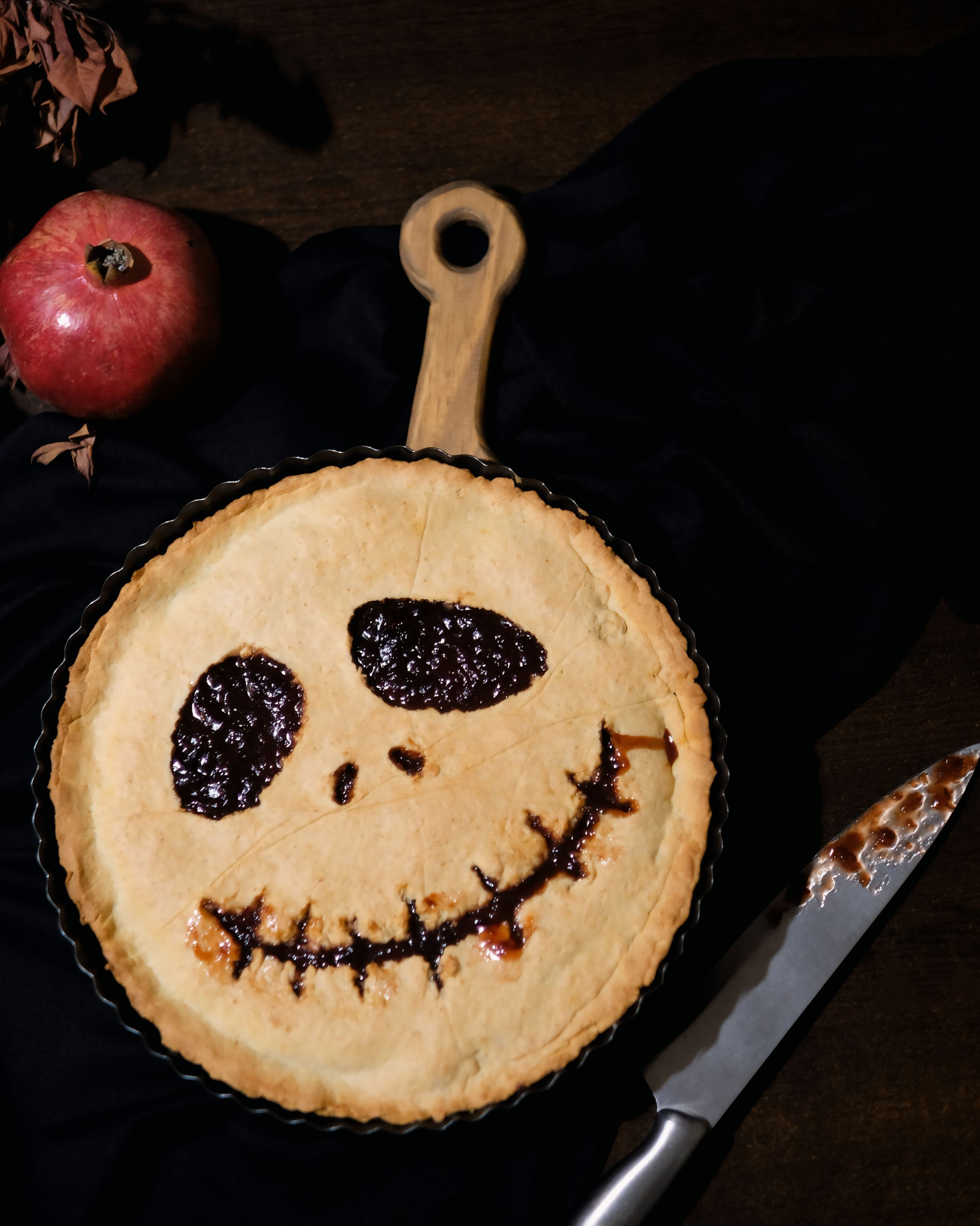 Spooky Halloween Pie with Creepy Face Design · Free Stock Photo