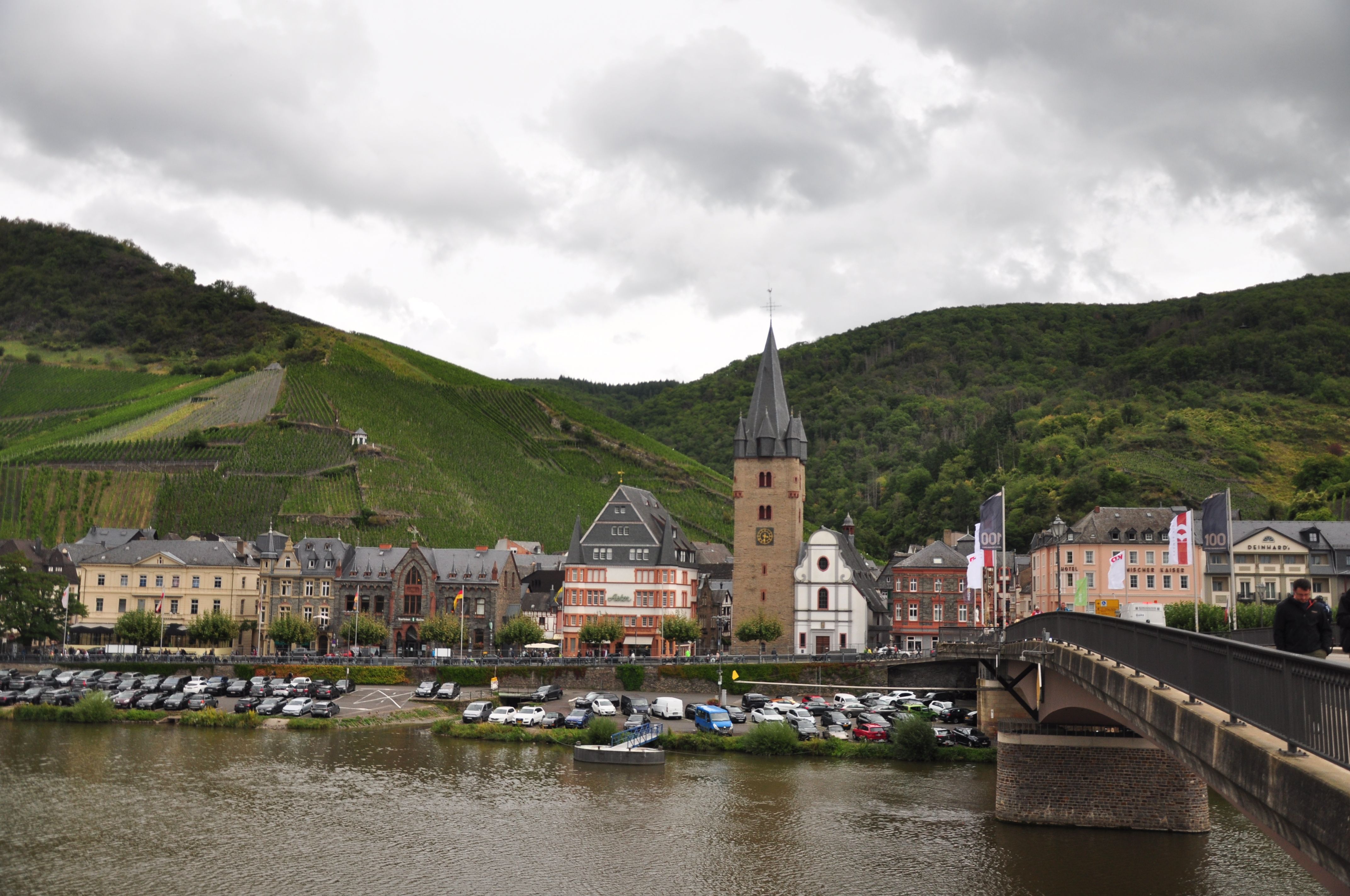 Castle on Hill over Village Near Body of Water · Free Stock Photo