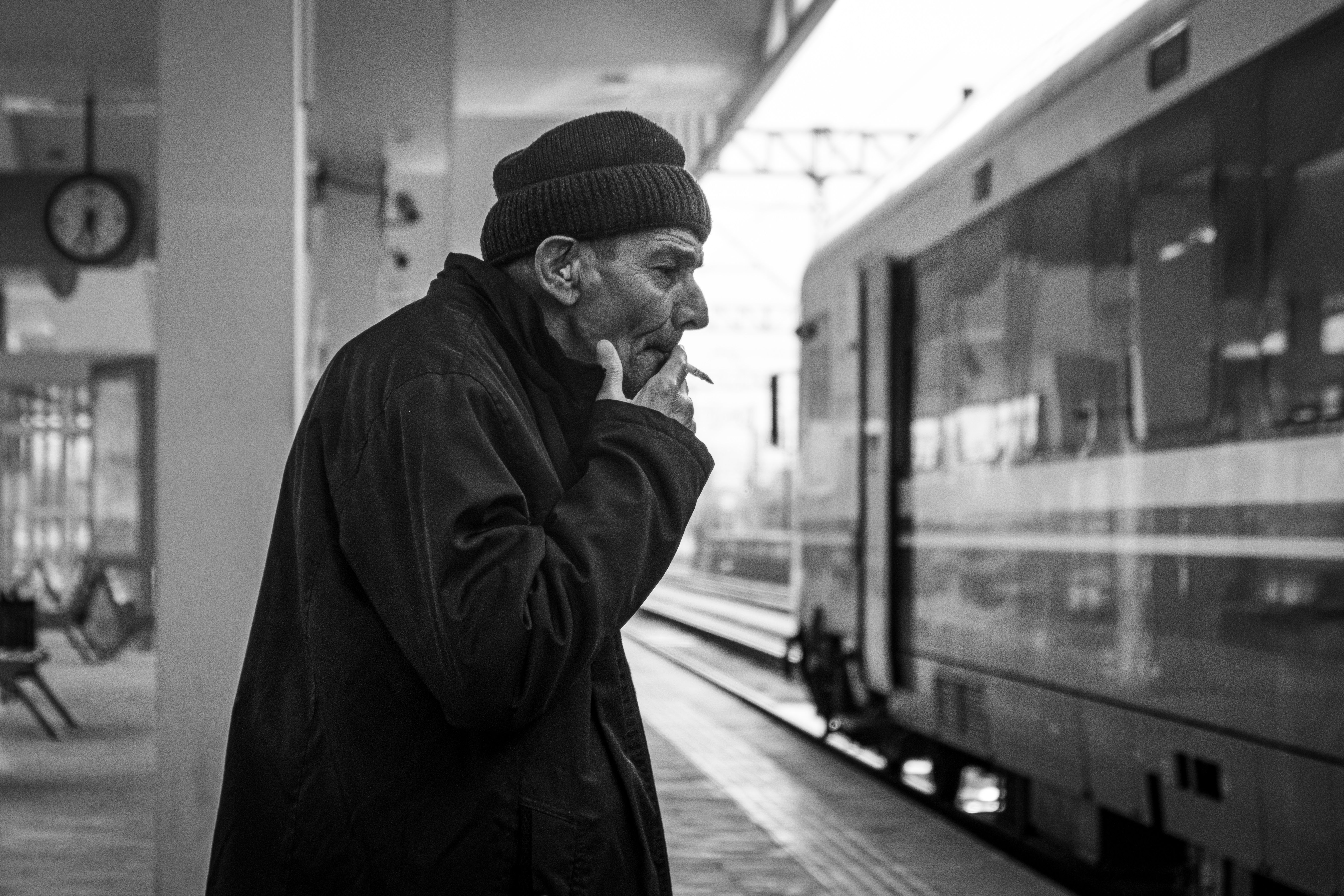 Elderly Man Smoking at Eskişehir Train Station · Free Stock Photo
