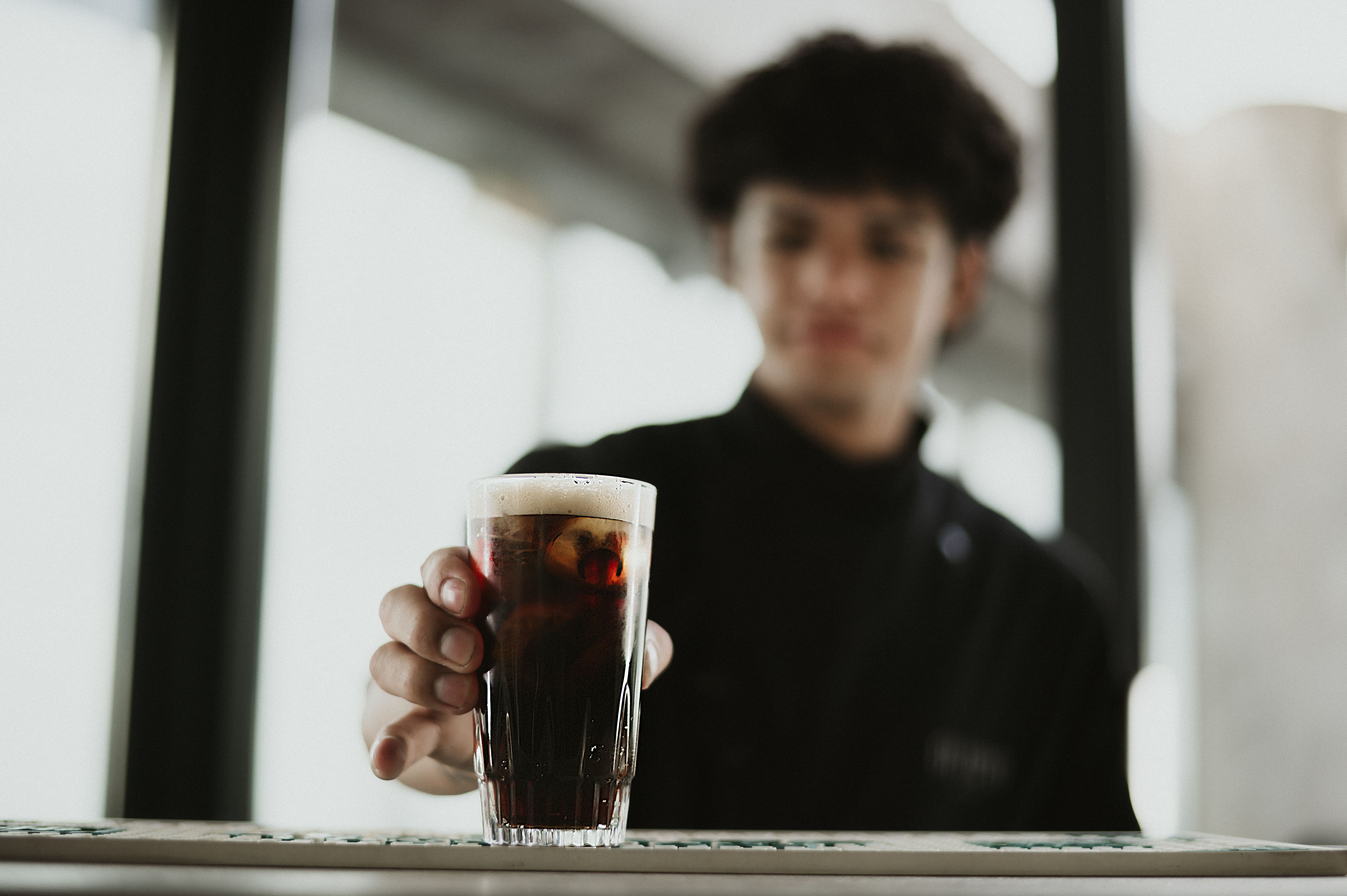 Barista Serving Cold Brew Coffee in Buenos Aires · Free Stock Photo