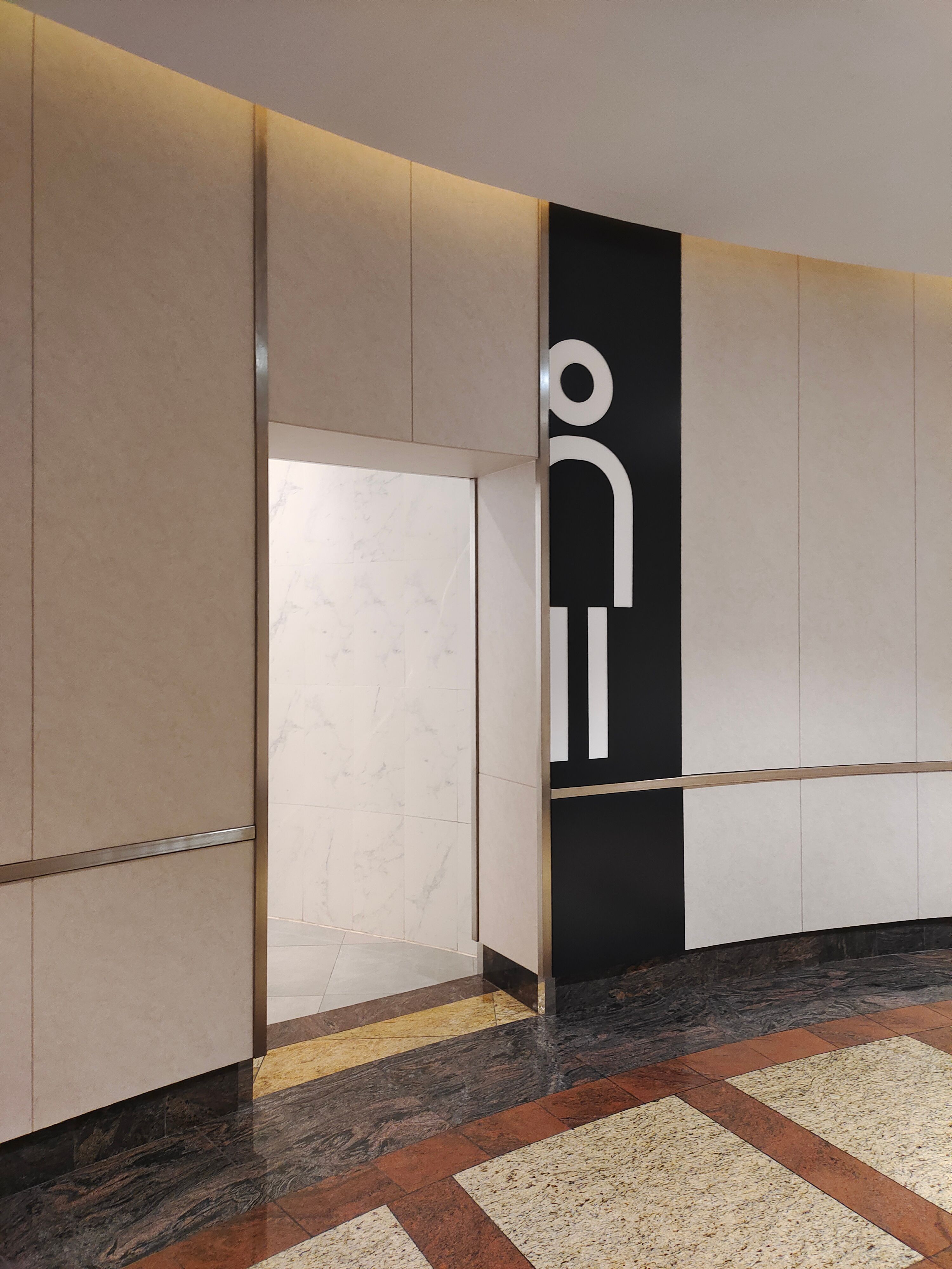 Modern Restroom Entrance in Commercial Building · Free Stock Photo