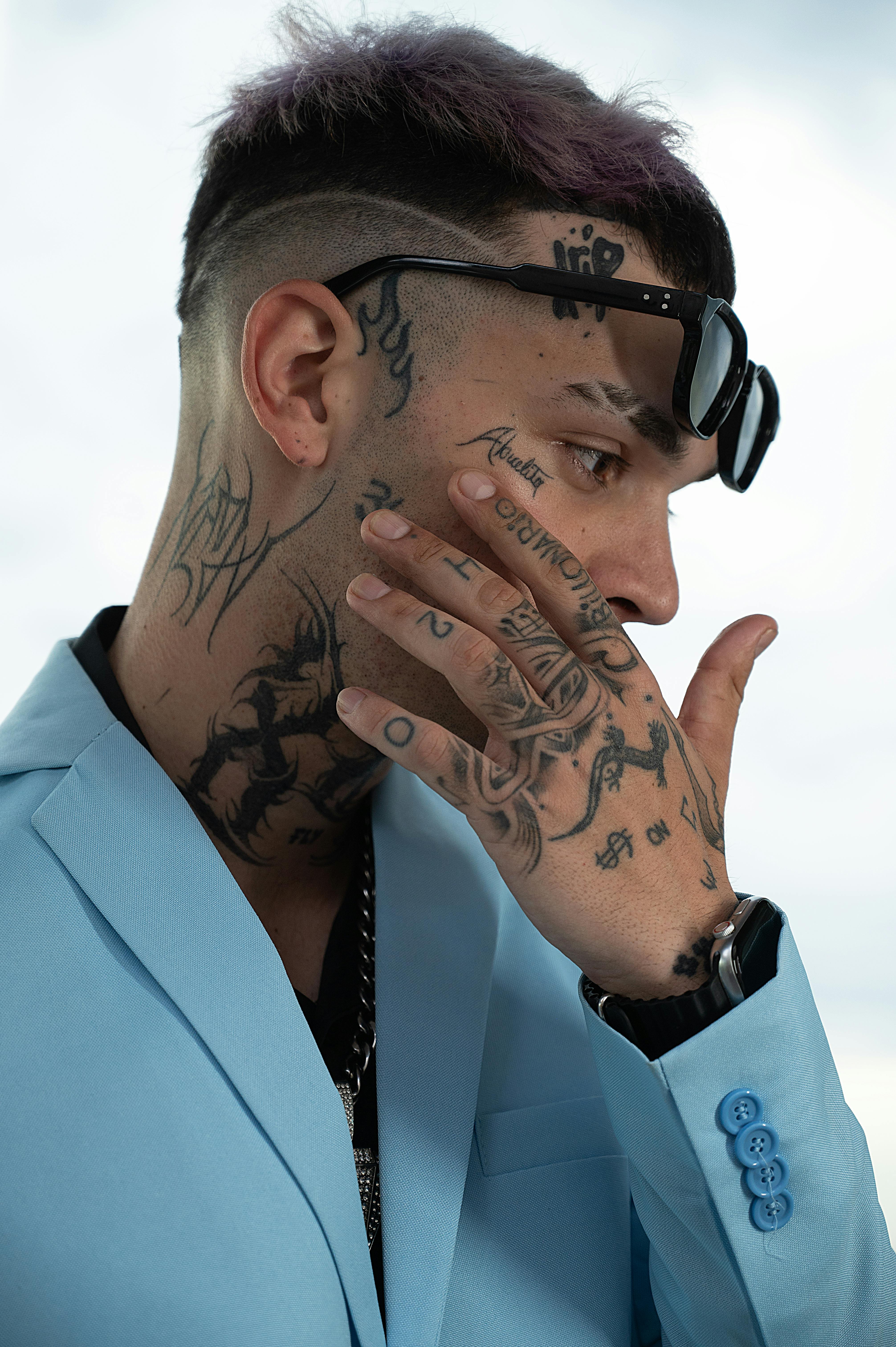 Stylish Tattooed Man in Light Blue Suit · Free Stock Photo