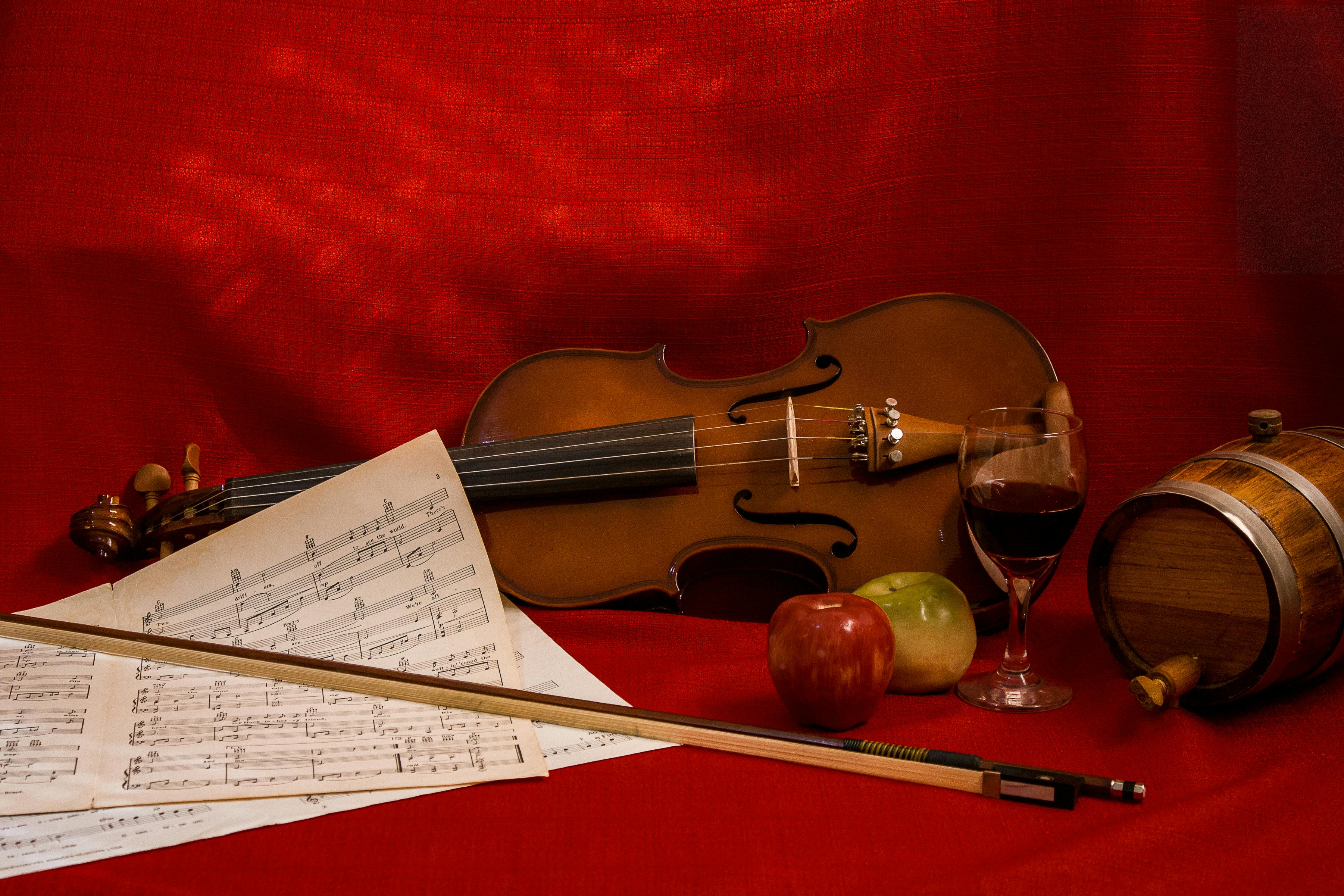 Brown Violin on Red Cloth · Free Stock Photo