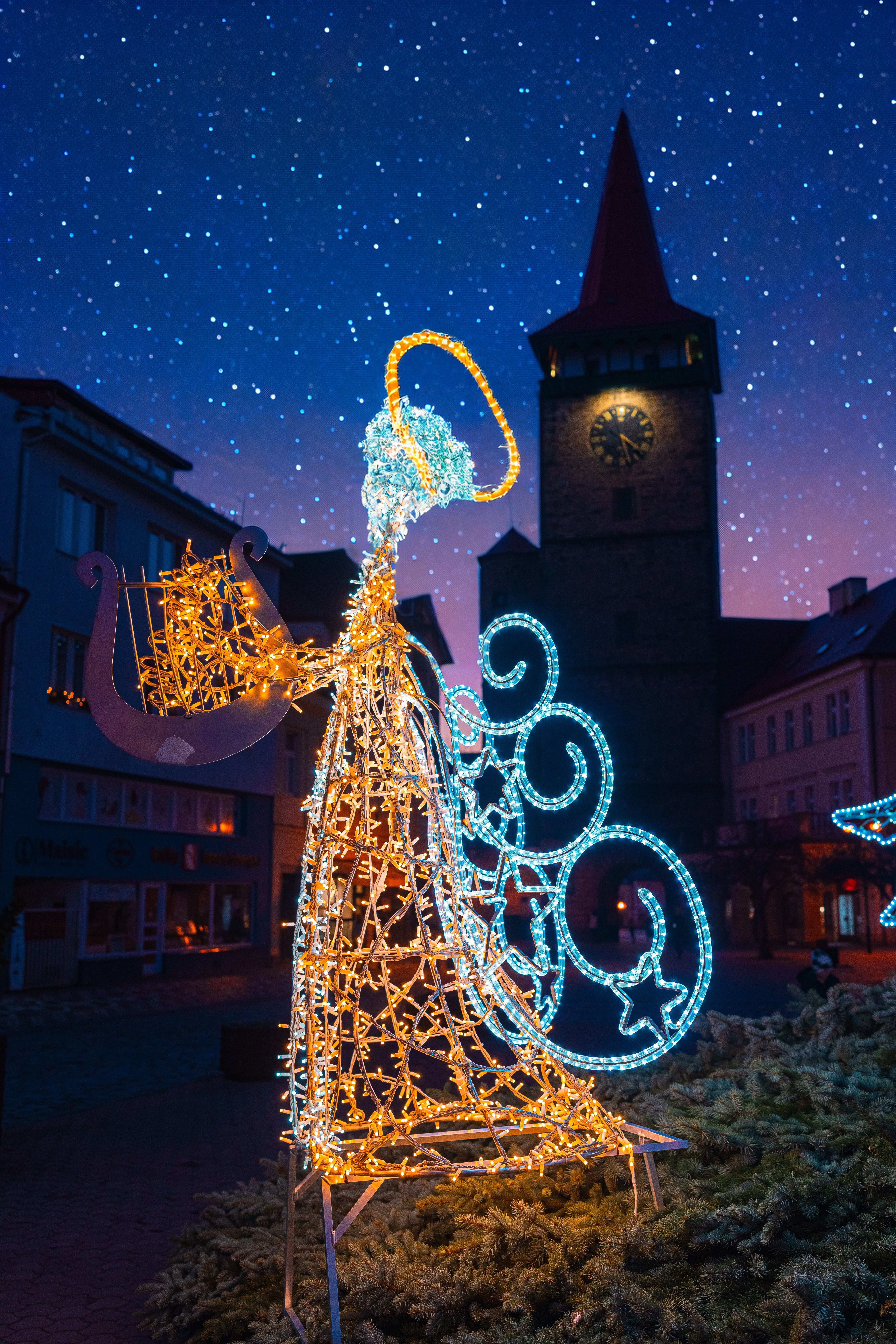 Illuminated Angel Sculpture in Jičín at Night · Free Stock Photo