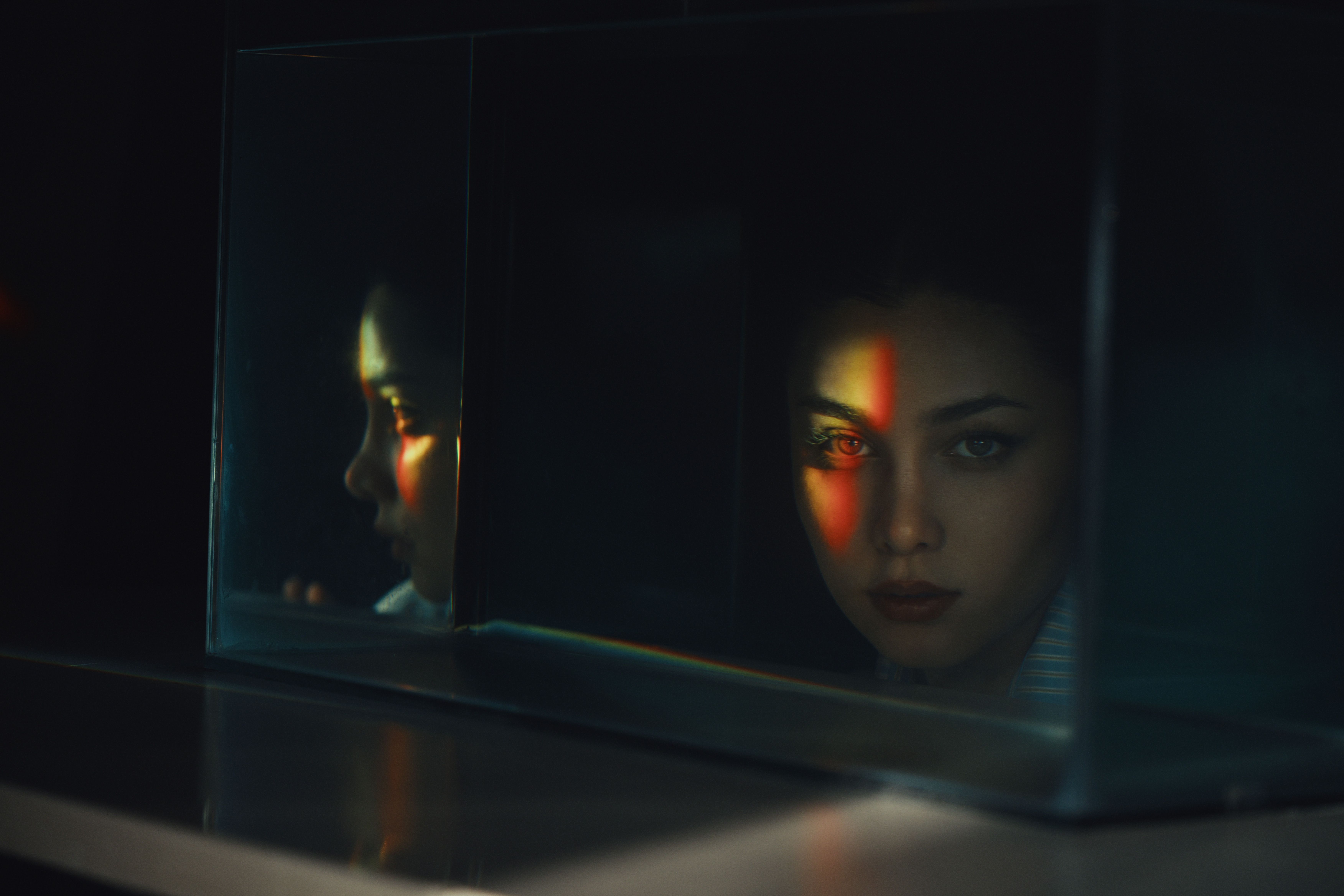 Mysterious Woman's Reflection in Dark Frame · Free Stock Photo